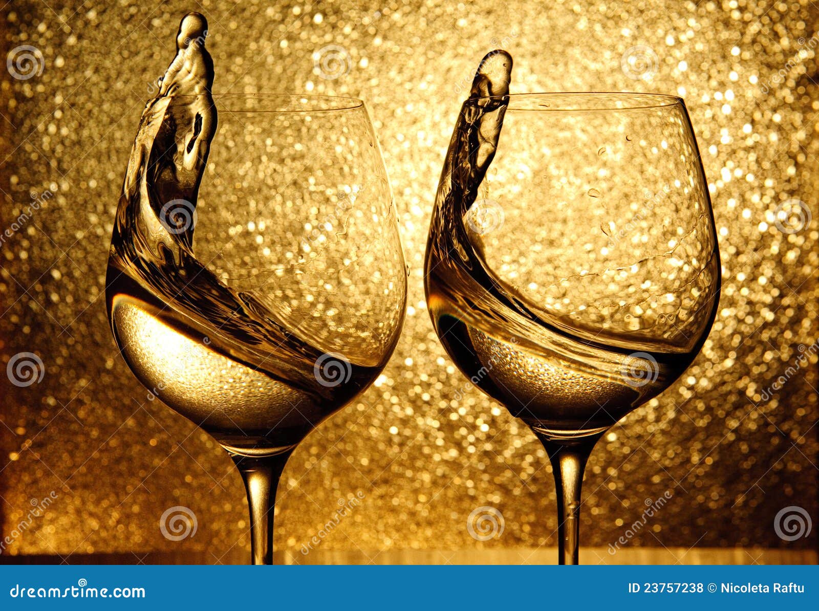 Two Glasses of White Wine Splashing Stock Photo - Image of crystal ...