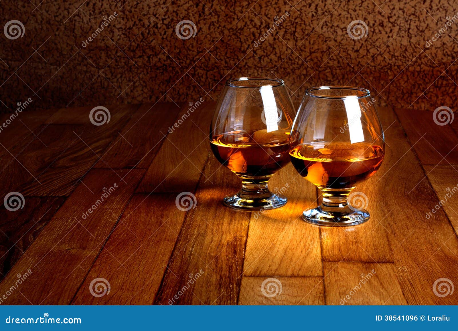 Two Goblets of Brandy on Wooden Counter Top Stock Photo - Image of ...