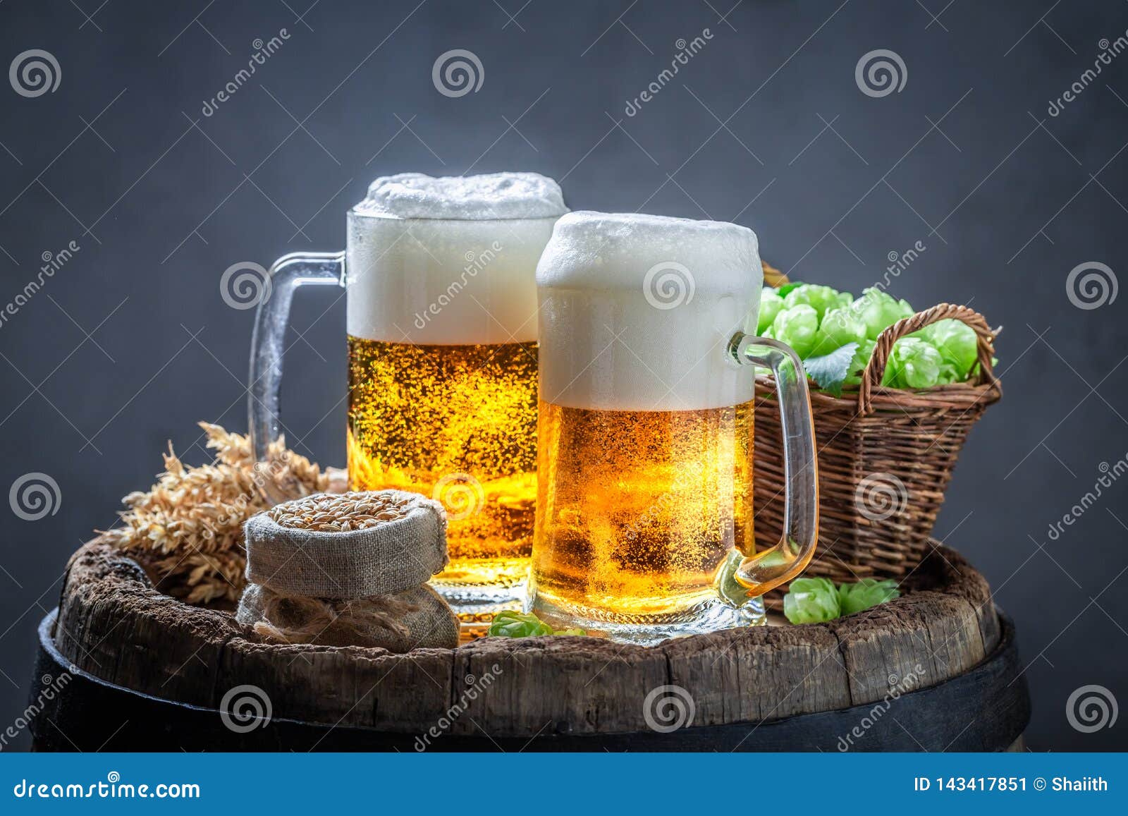 Two Gold Pints of Beer on Old Barrel Stock Image - Image of beer ...
