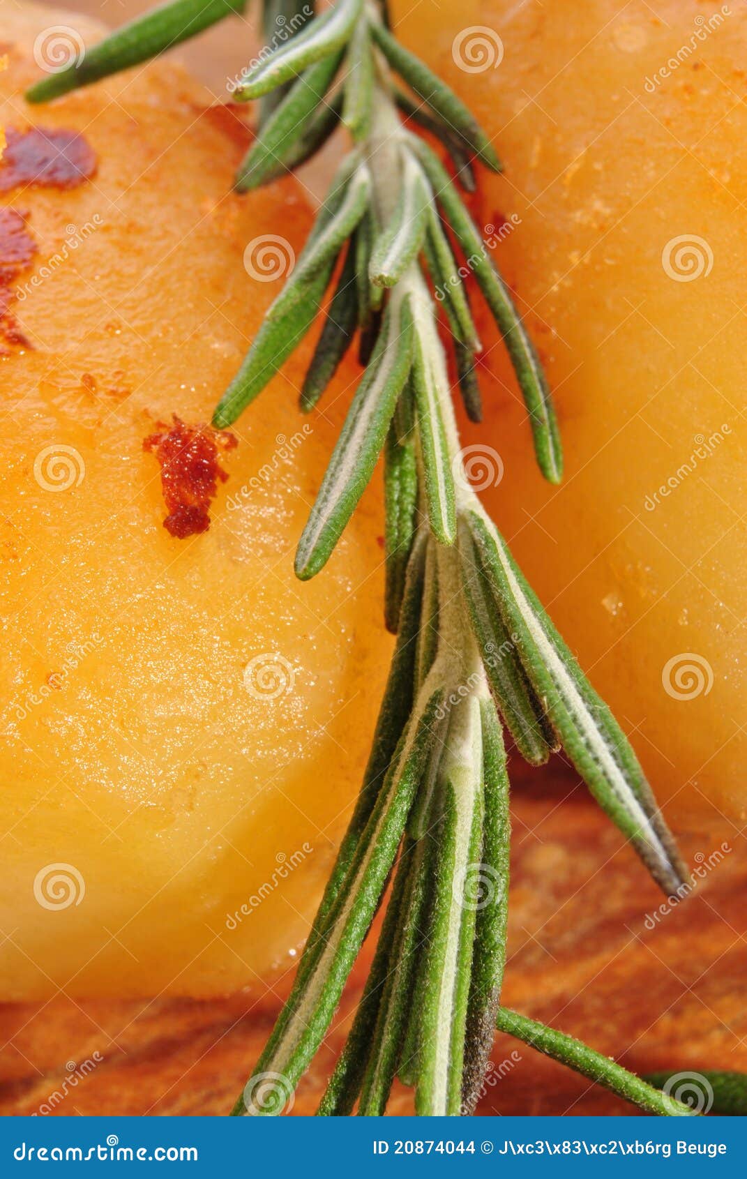 Two Golden Brown Roasted Potatoes Stock Photo - Image of food, rosemary ...