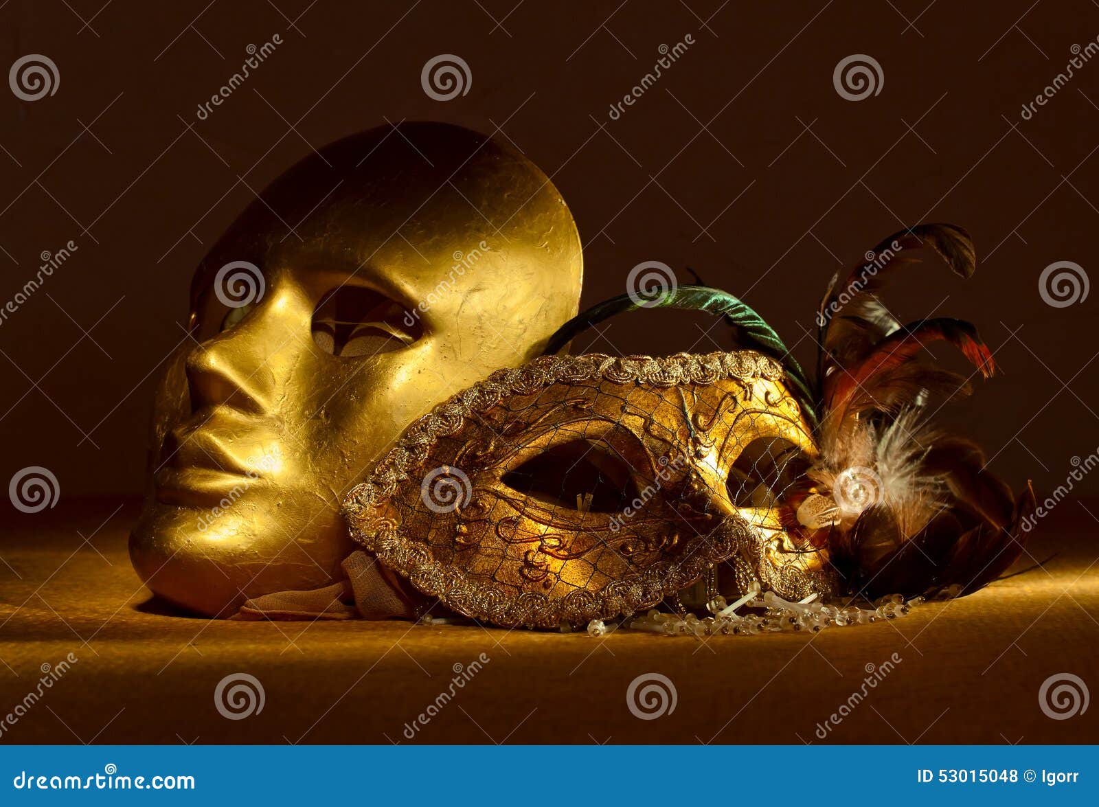 Two golden Venetian masks stock photo. Image of bead - 53015048