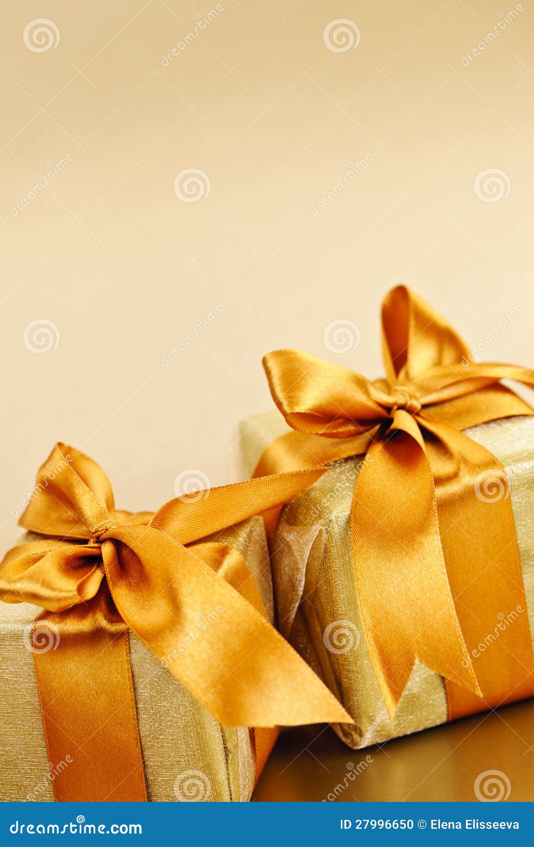 Two Golden Wrapped Gift Boxes Stock Photo - Image of pretty, giftwrap ... Two Golden Wrapped Gift Boxes Stock Photo - Image of pretty, giftwrap ...