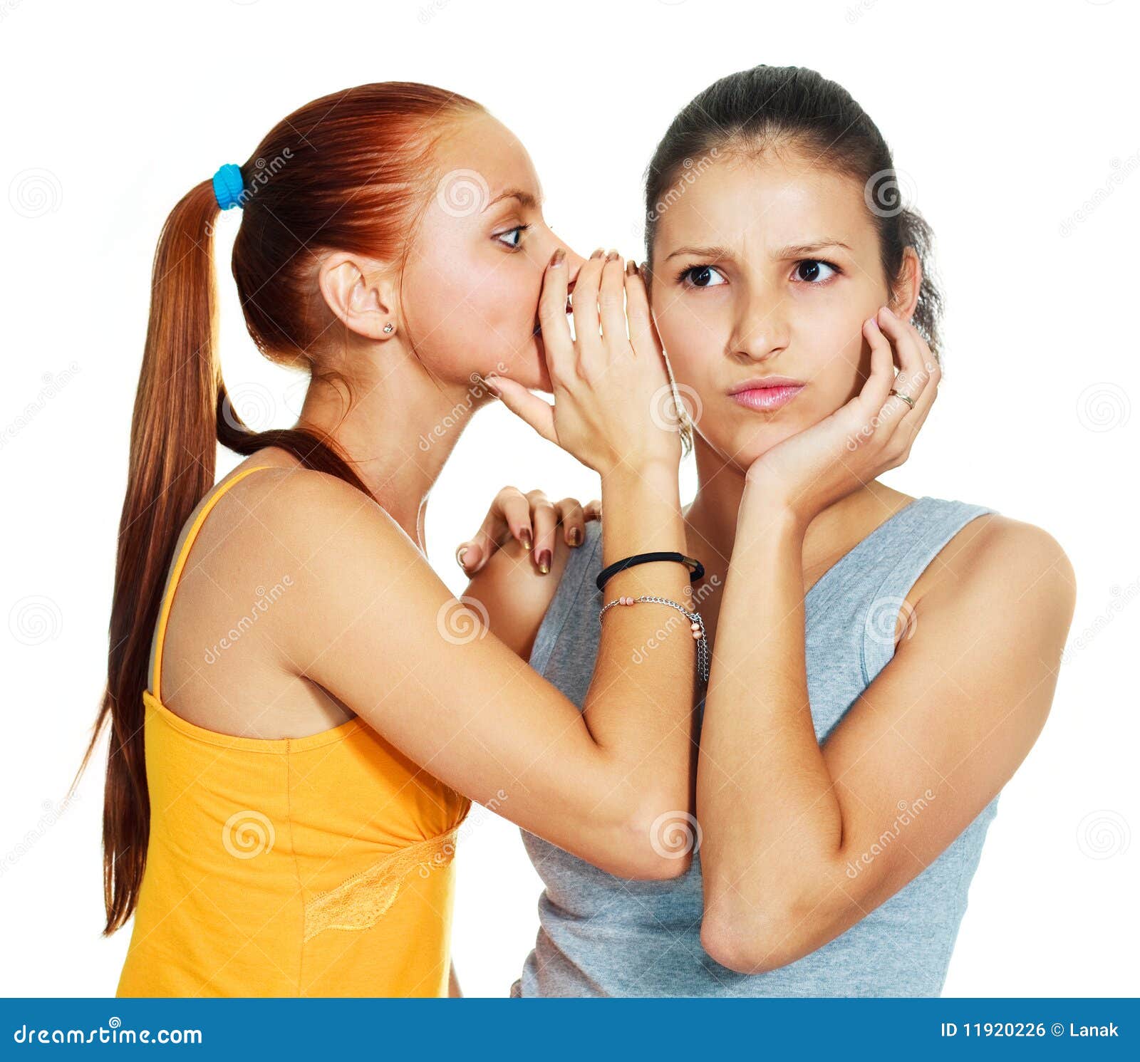Two gossiping girls stock photo. Image of expression - 11920226