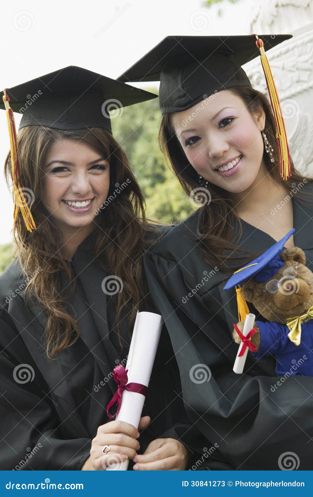 Two Graduates Holding Diploma and Teddy Bear Portrait Stock Image ...