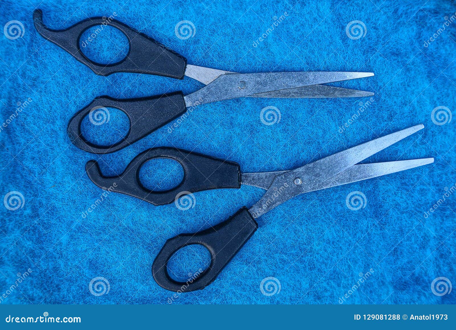 Two Gray Black Metal Scissors on Blue Wool Stock Photo - Image of ...