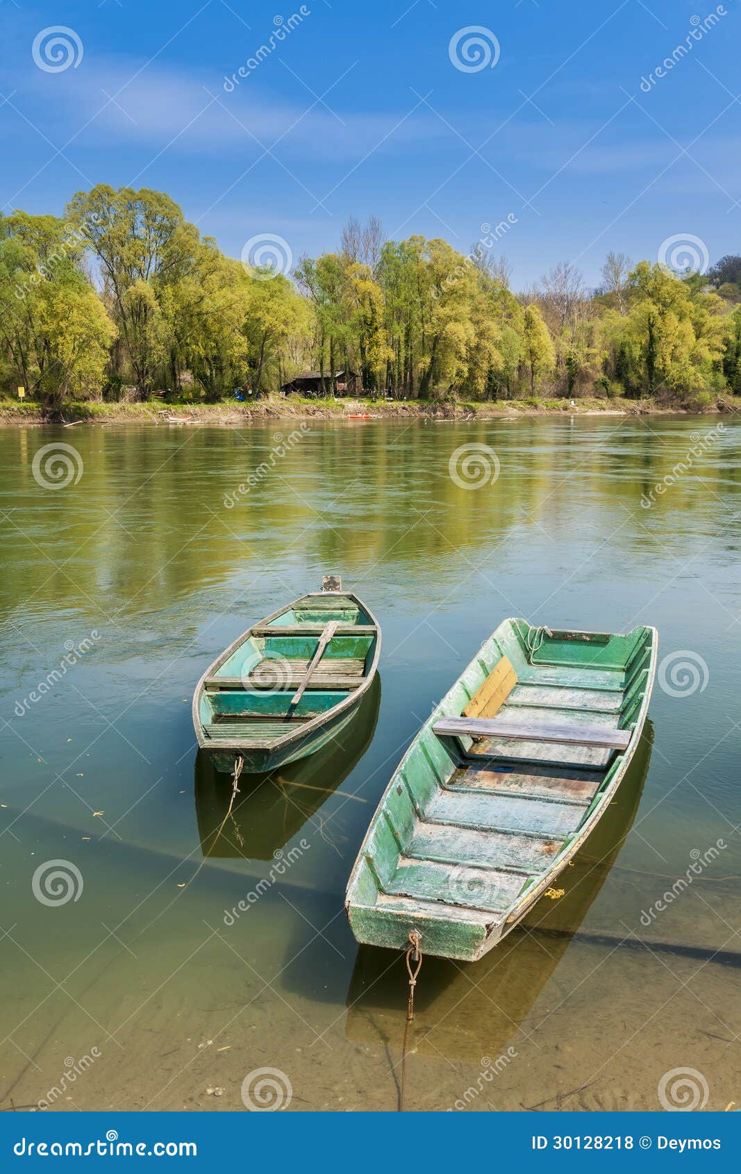 Two Boats on the River Bank Stock Photo - Image of rowing, color: 30128218