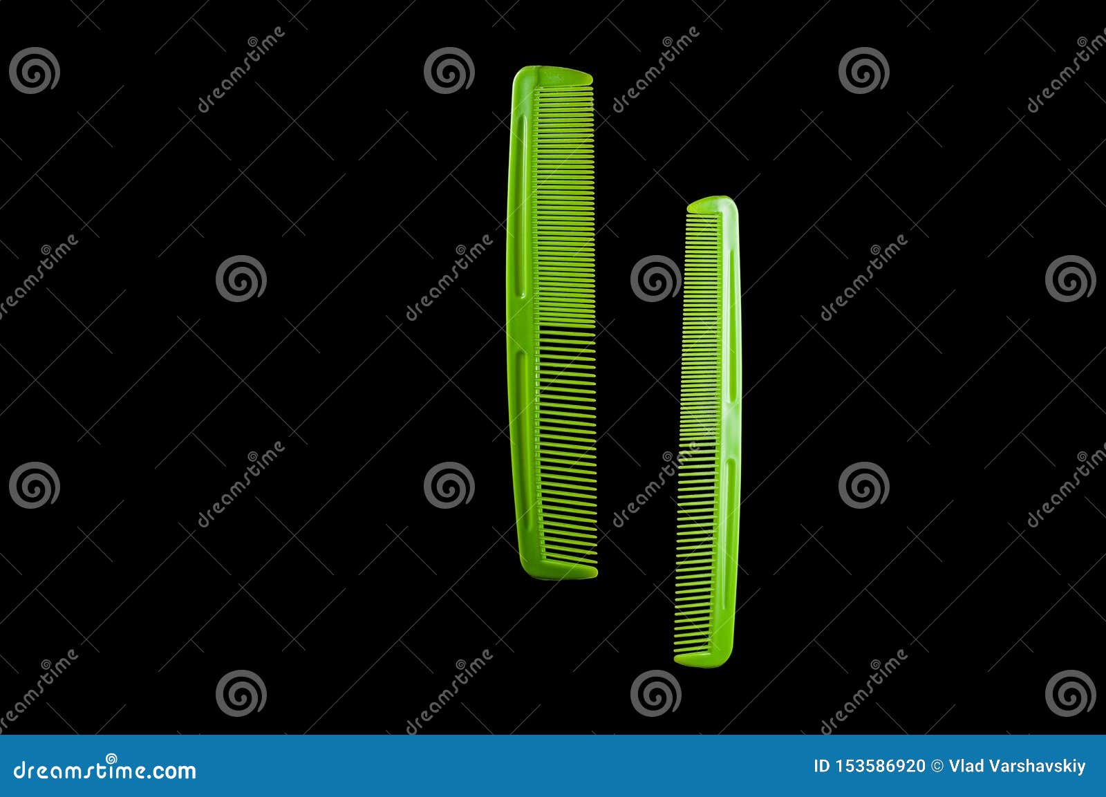 Two Green Combs on a Black Background, Isolate Stock Photo - Image of ...