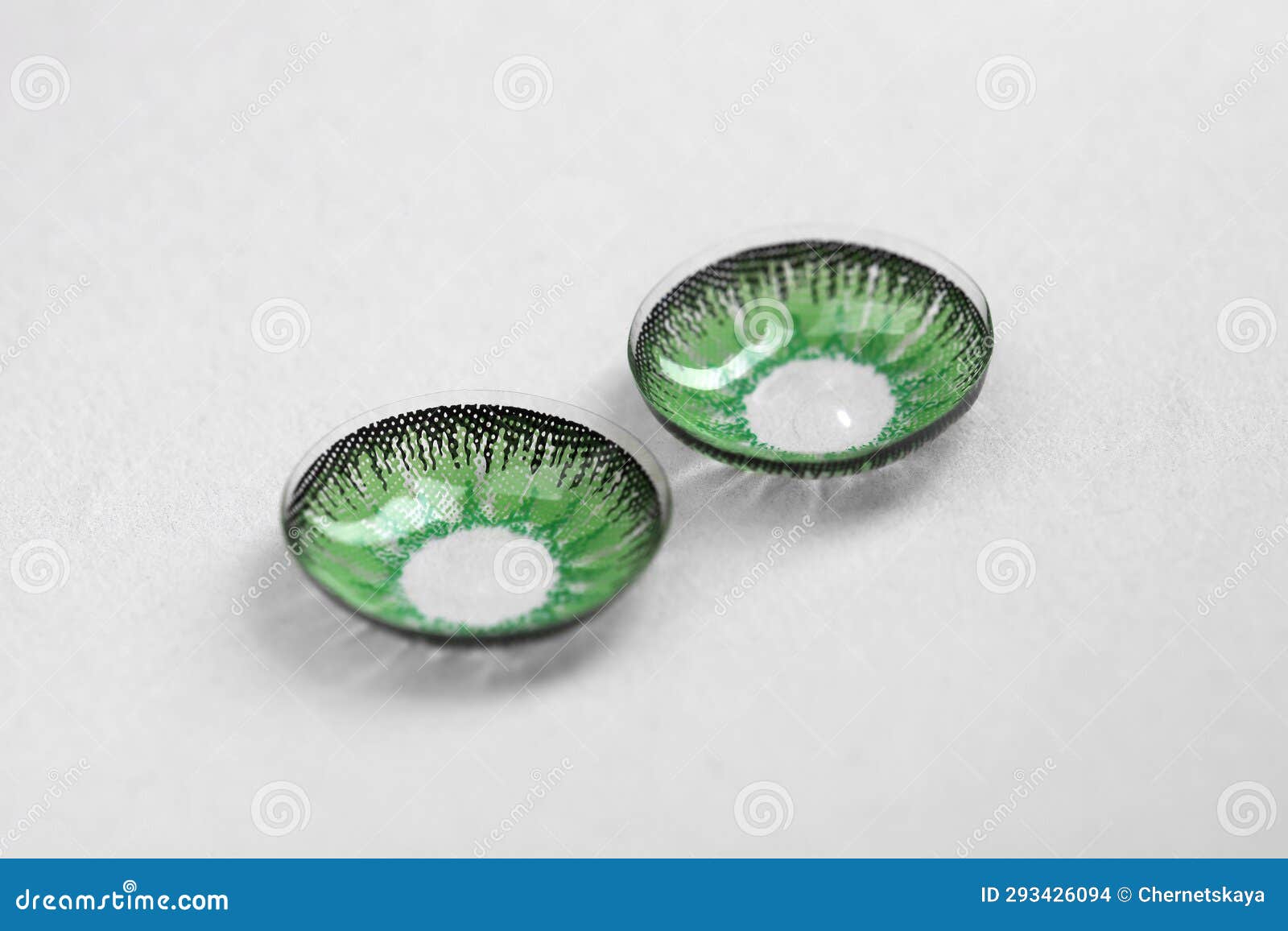 Two Green Contact Lenses on White Background Stock Photo - Image of ...