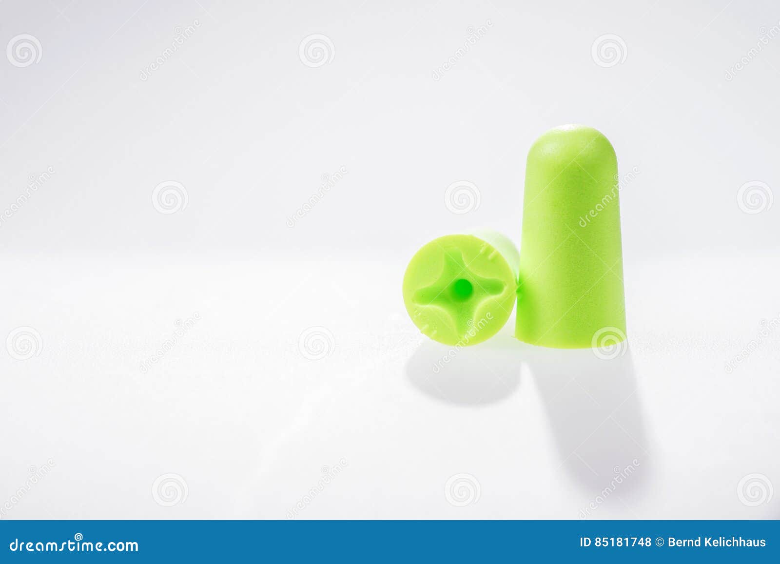 Two Green Ear Plugs Isolated on White Stock Photo - Image of industry ...