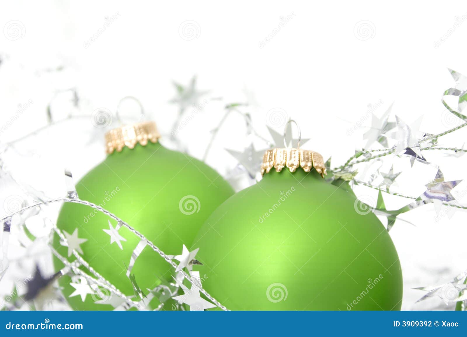 Two Green Ornaments with Silver Stars Stock Photo - Image of globe ...