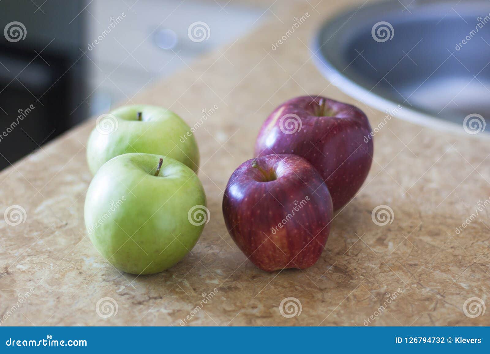 Two Green and Two Red Apples on the Table Stock Photo - Image of fresh ...