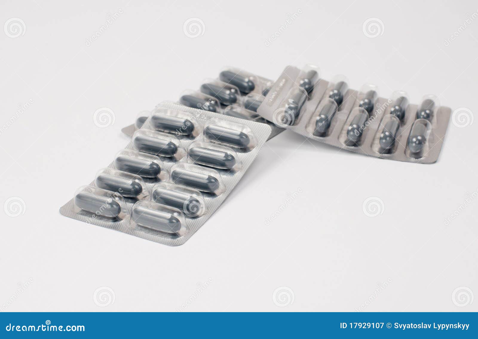 Two grey pills on white stock image. Image of help, blister - 17929107
