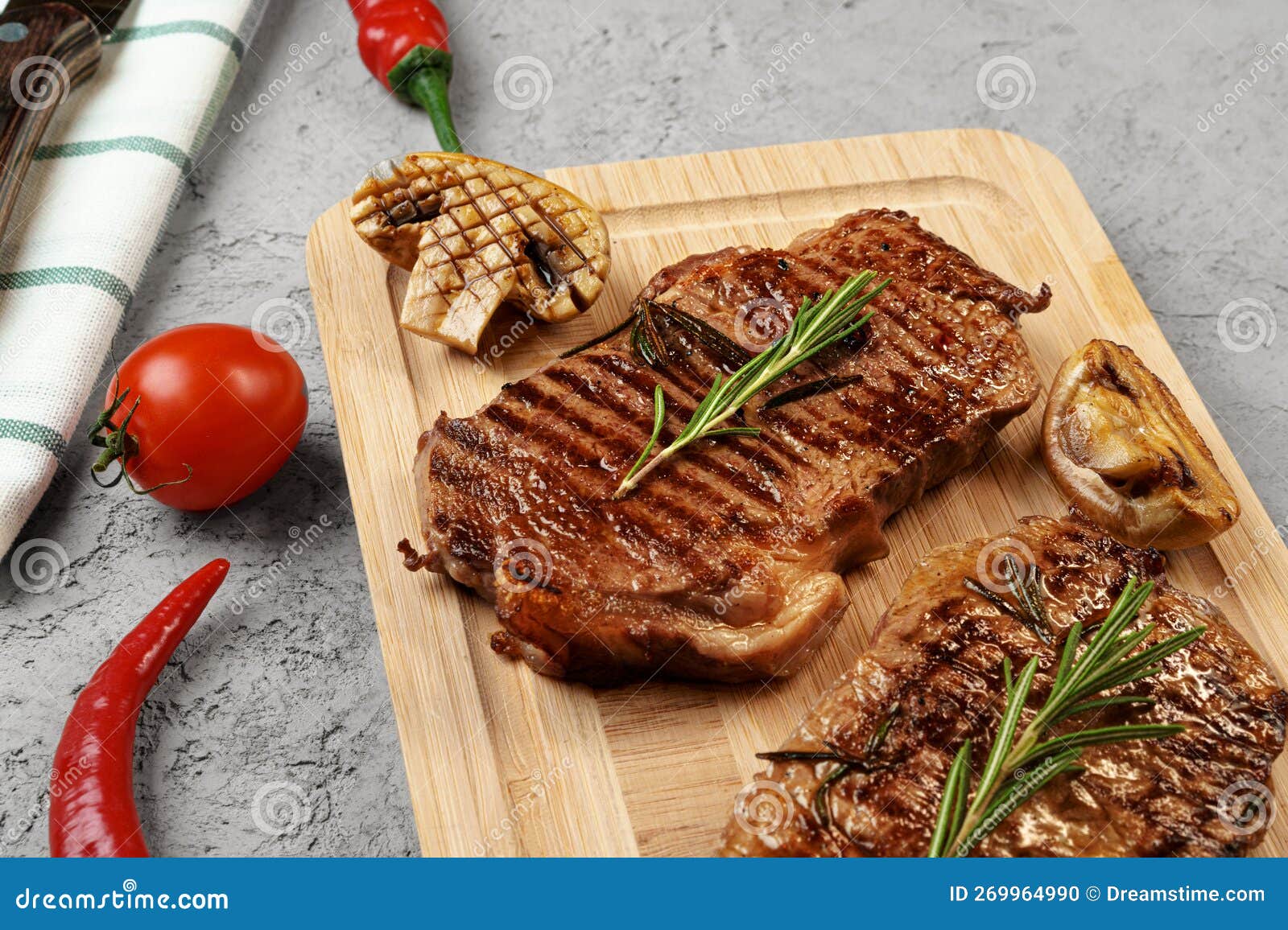 Two Grilled Beef Steaks on Wooden Board Stock Photo - Image of steak ...