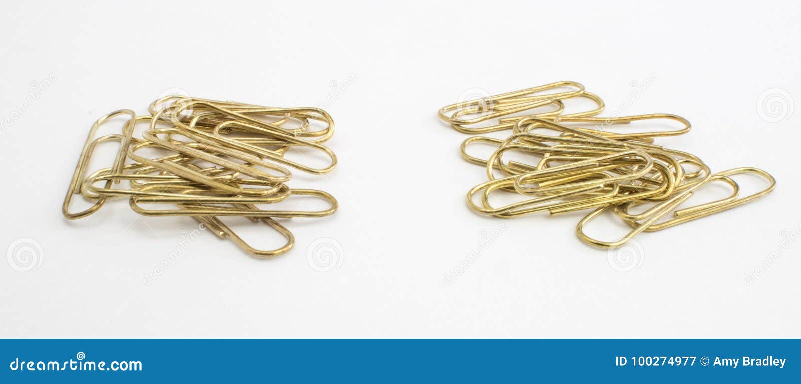 Gold Paper Clip Battle stock image. Image of advisaries - 100274977