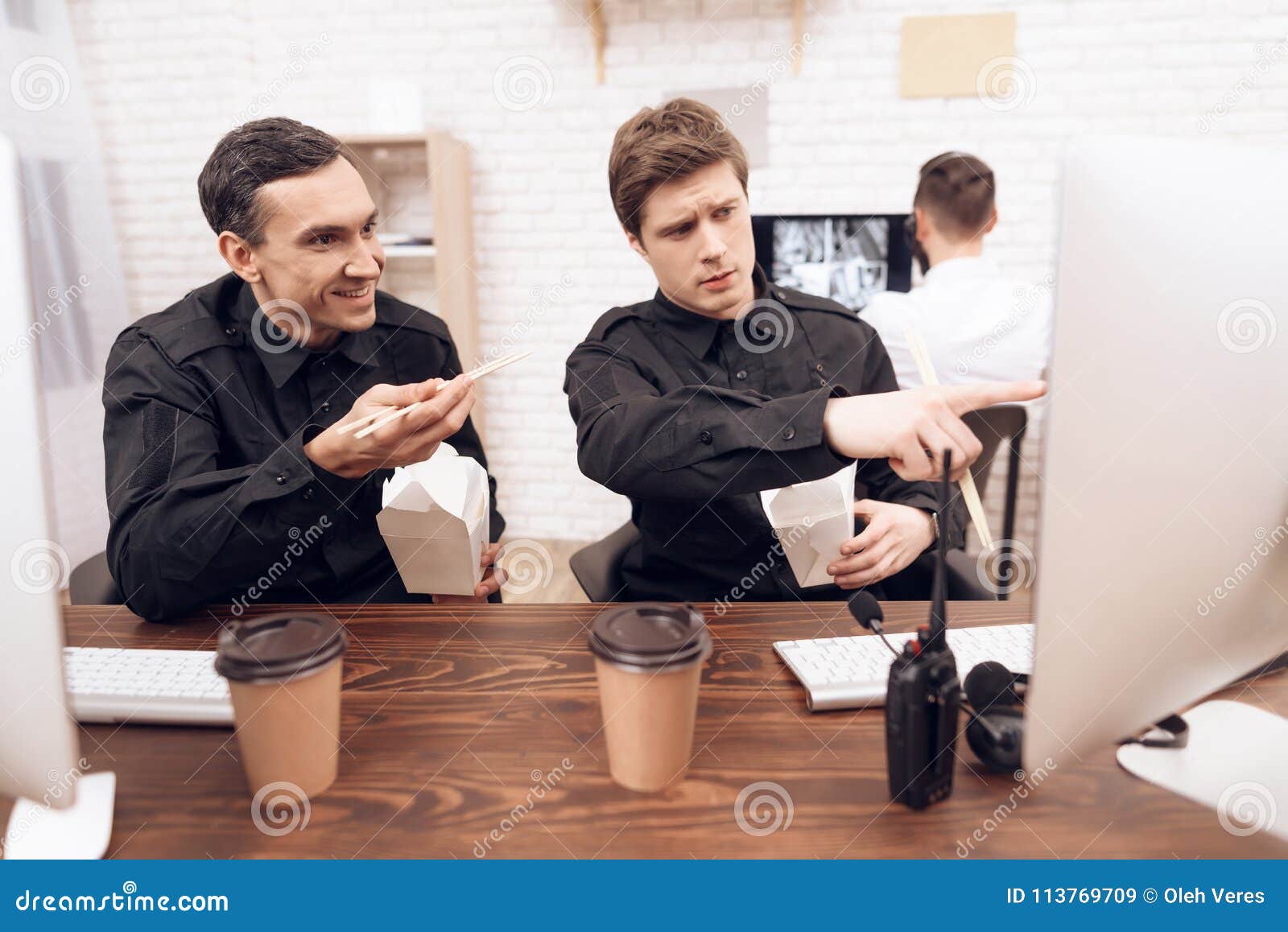 Two Guards Have Lunch In The Workplace Stock Image Image Of Office Digital 113769709