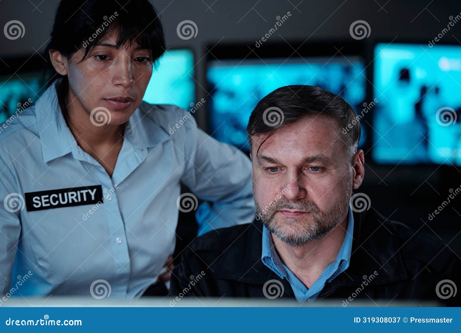 Two Guards Looking at Computer Screen Stock Image - Image of ...