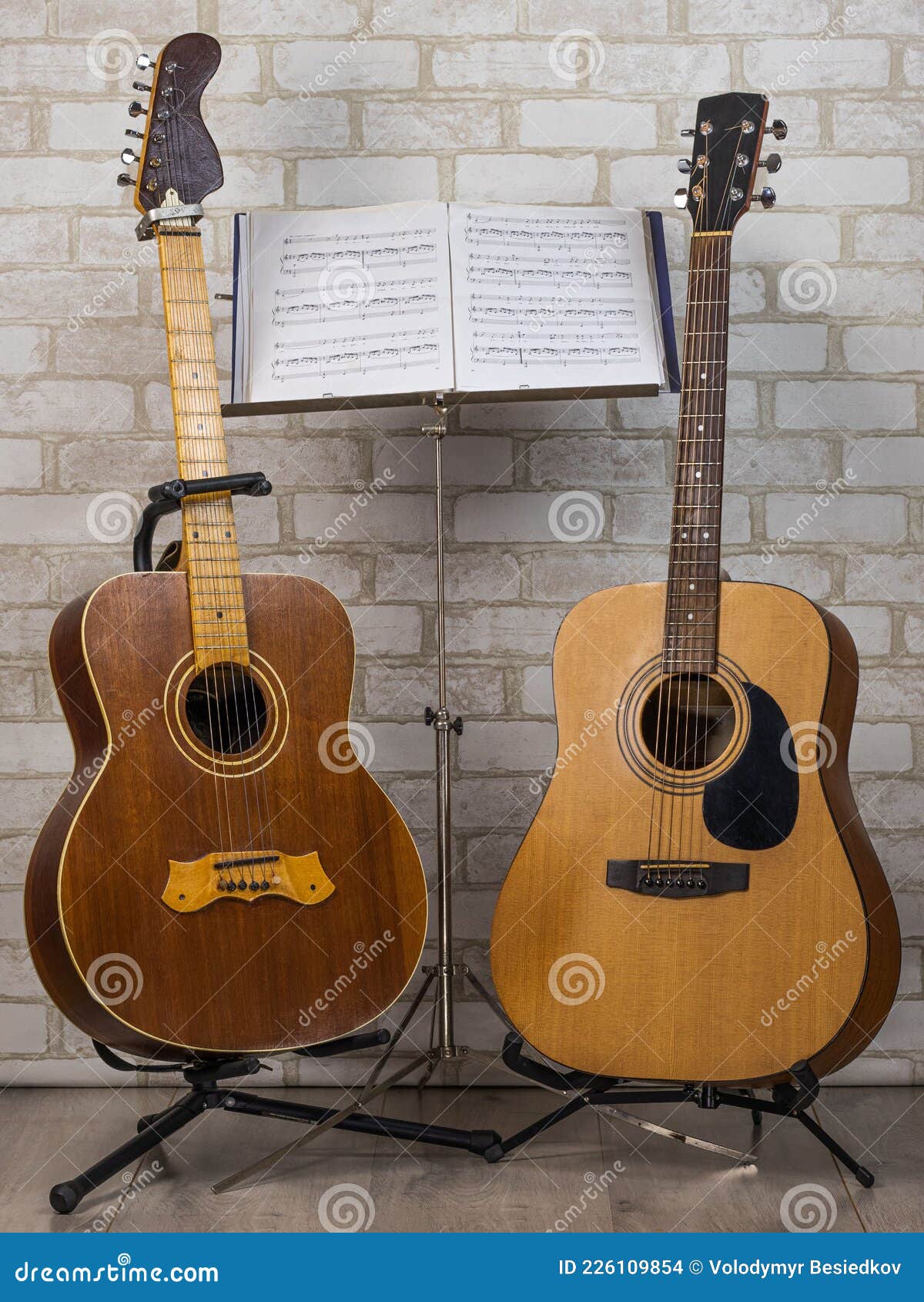 Two guitars stock photo. Image of sound, acoustic, stands - 226109854