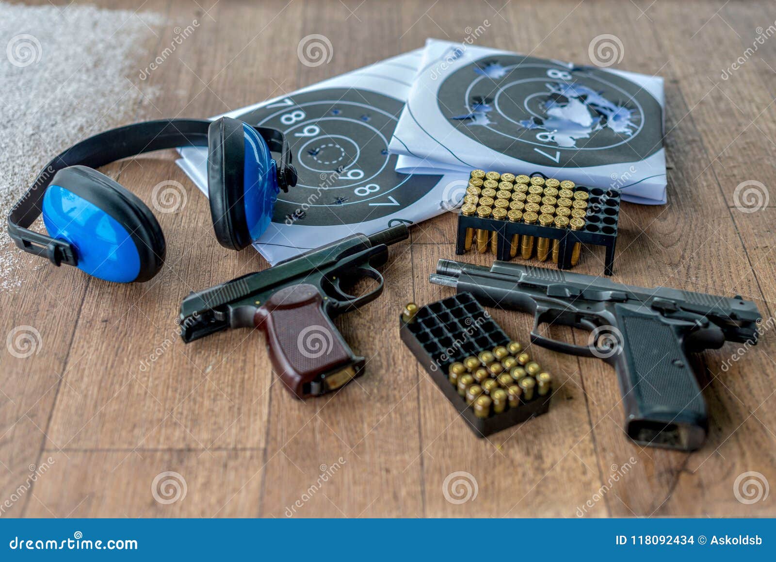 Two Guns, Ammunition Packs and Shoot the Goal. Stock Photo - Image of ...