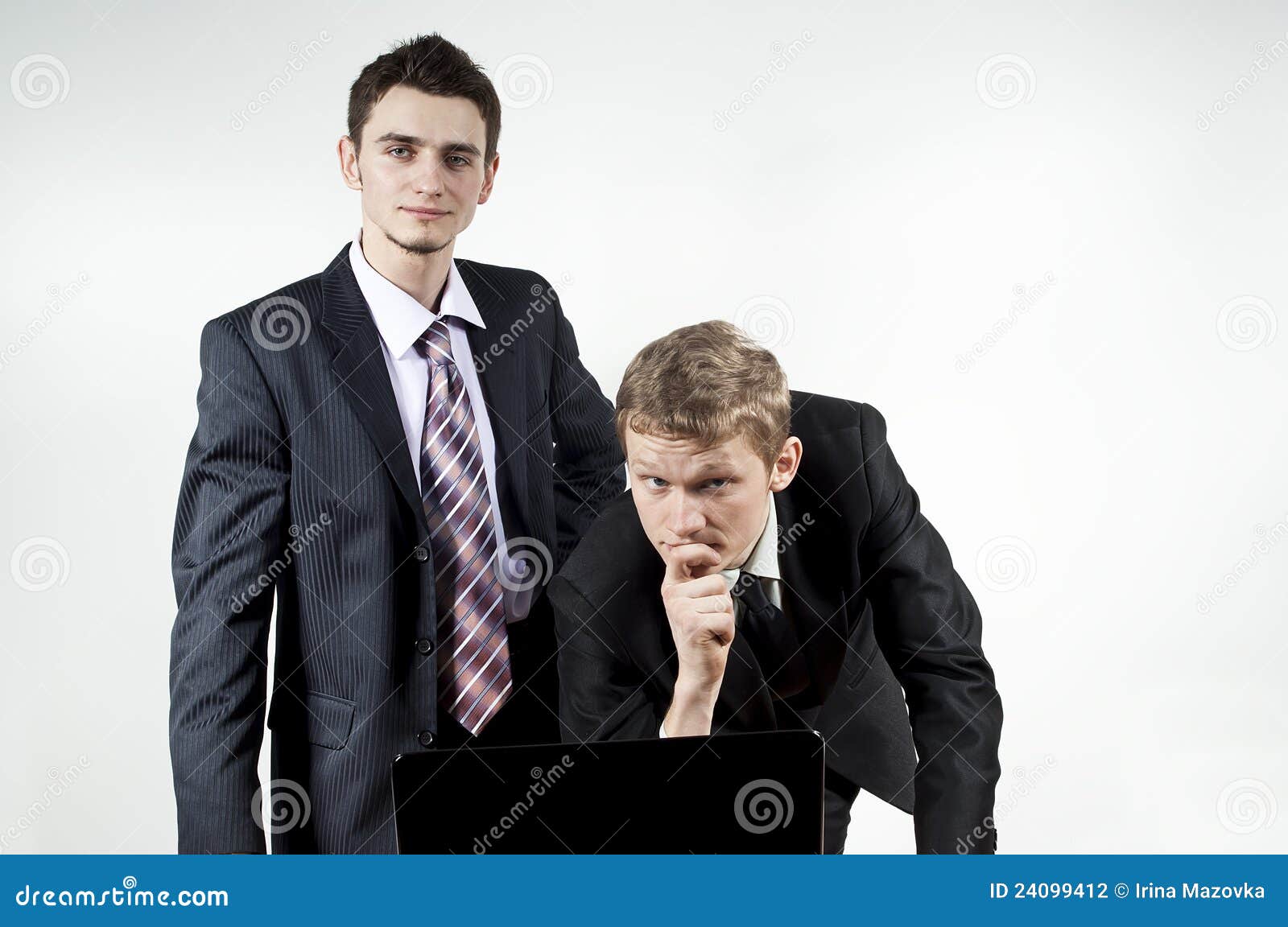 Two Guys Collaborating To Laptop Stock Photo - Image of person ...