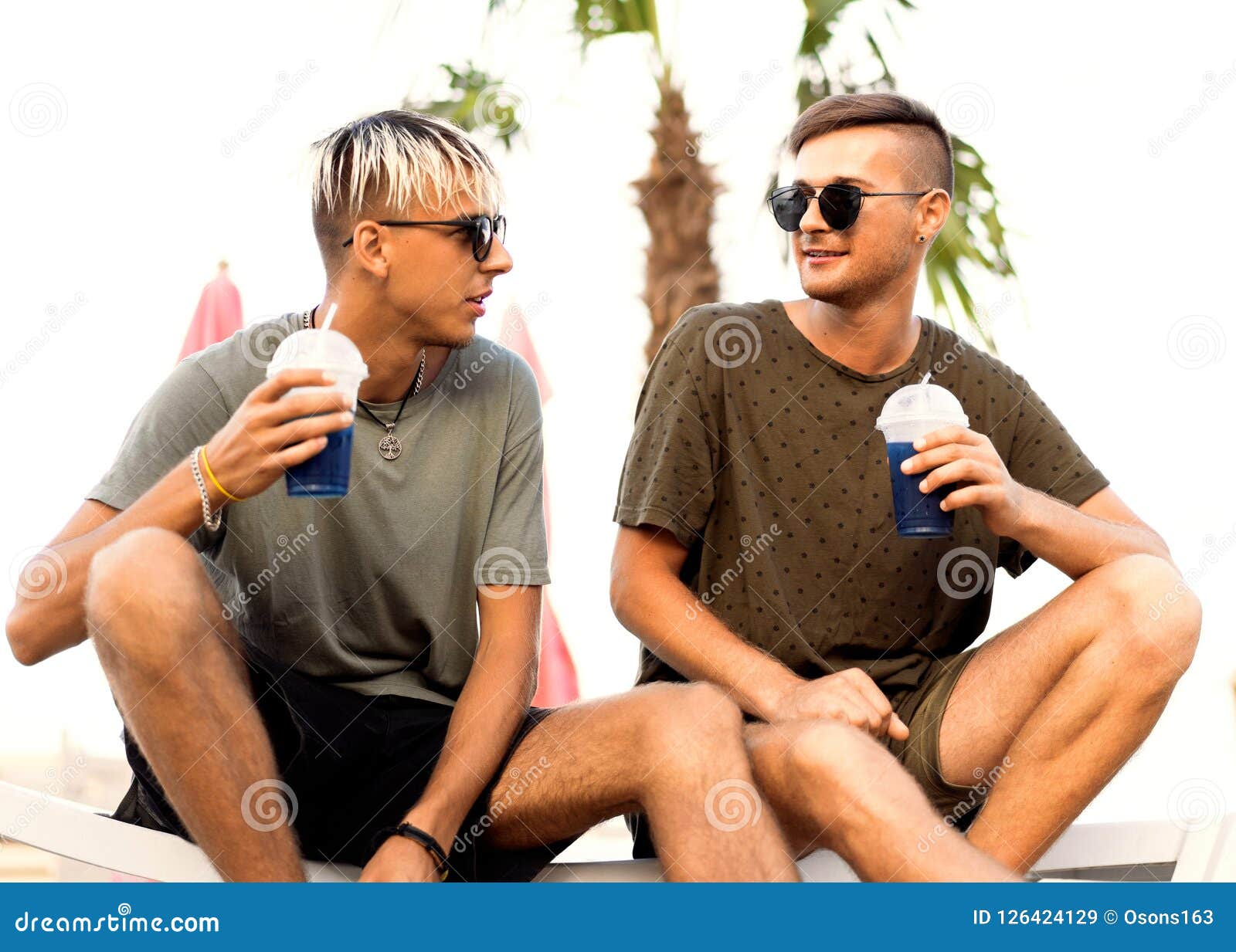 Two Guys Drink Cocktails on a Tropical Beach Stock Image - Image of ...