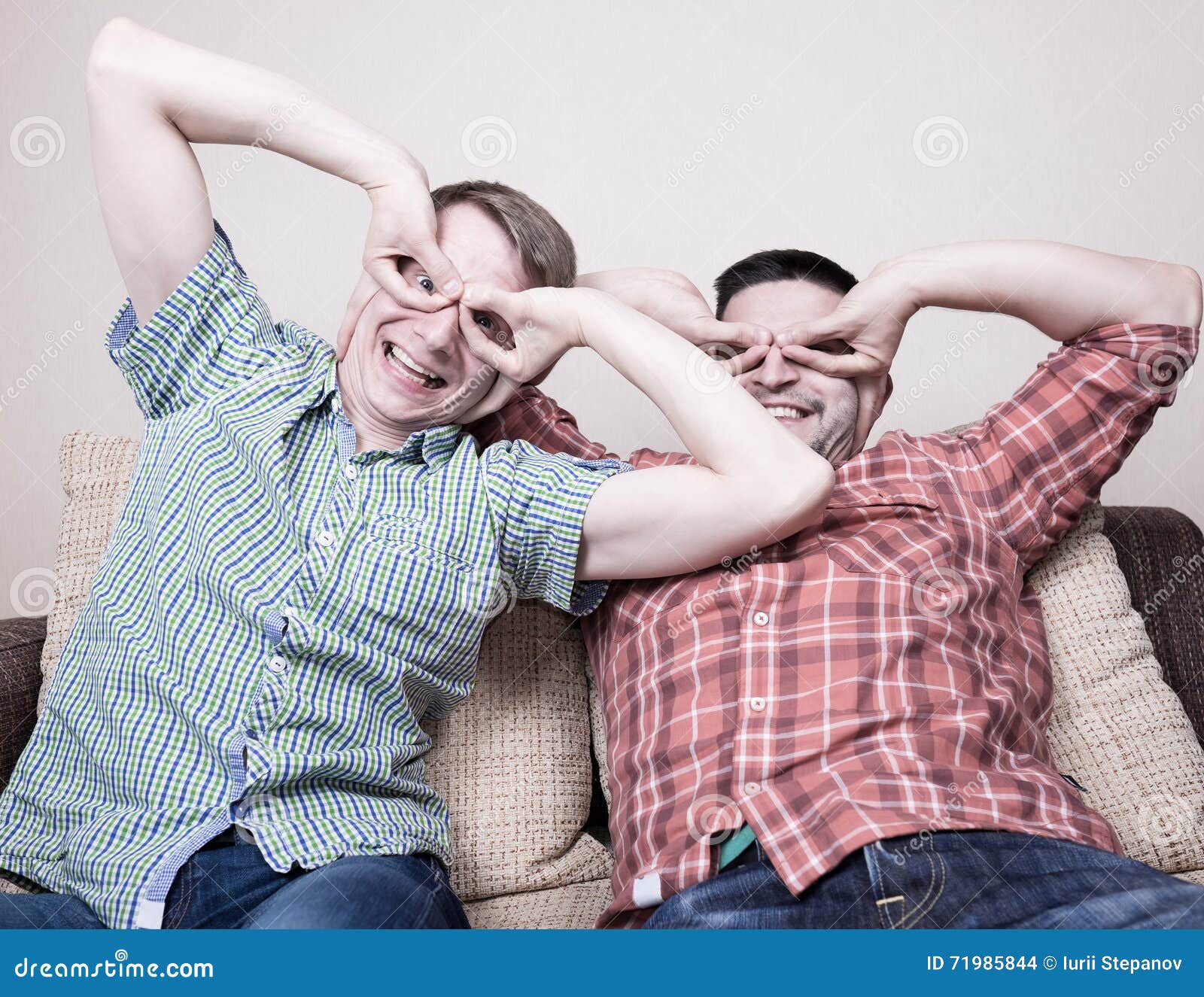 Two Guys with Funny Gestures Stock Photo - Image of people, smile: 71985844