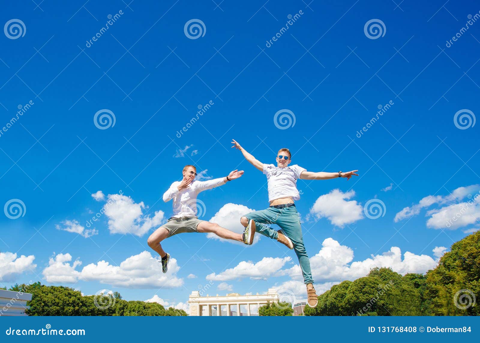 Two Guys are Hovering in the Air Stock Photo - Image of background ...