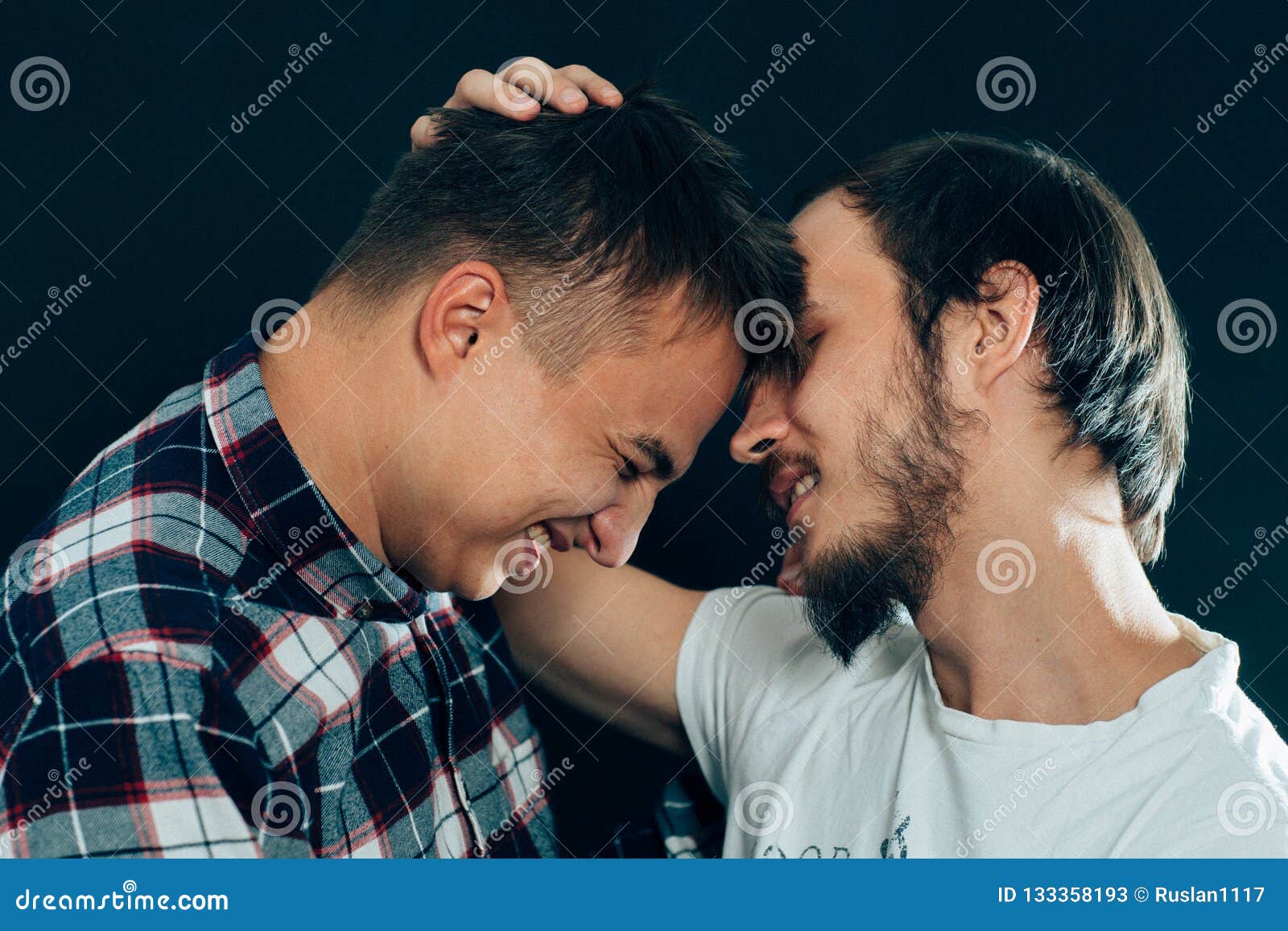 Two Guys Hugging on a Dark Background Stock Image - Image of fingers ...