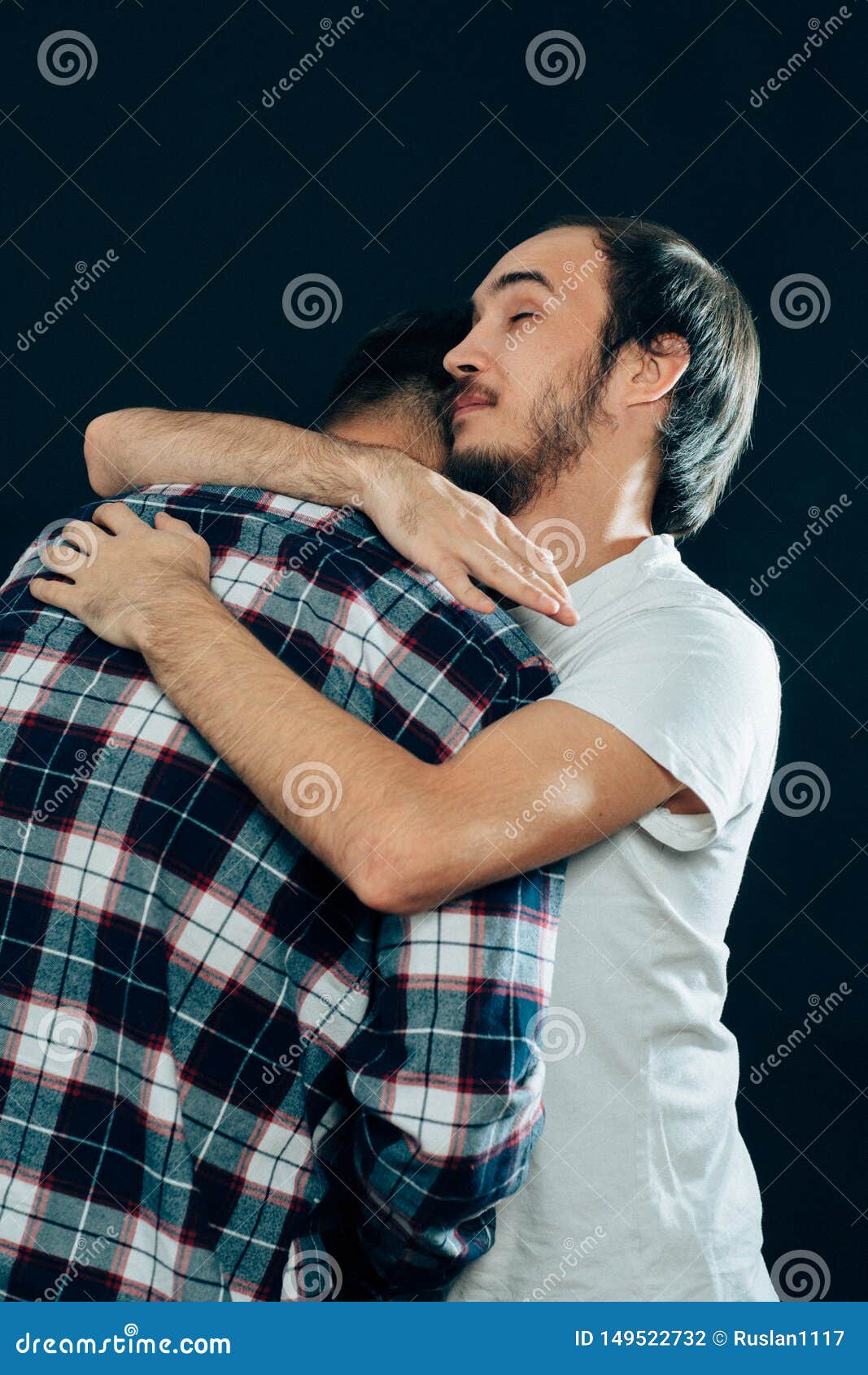 Two Guys Hugging on a Dark Background Stock Photo - Image of lifestyle ...