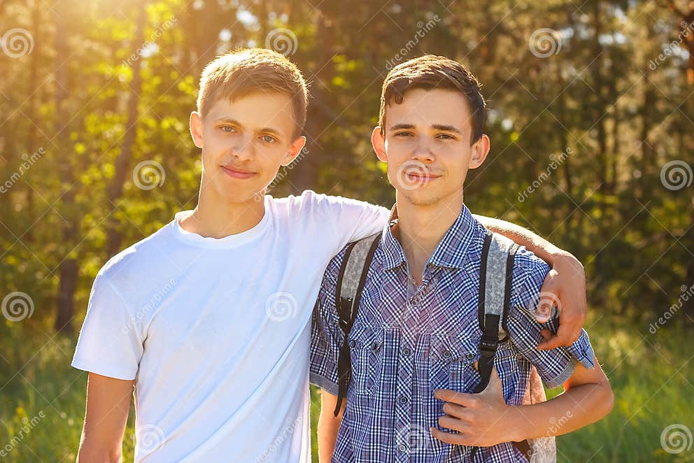Two Guys Hugging on a Sunny Day Stock Photo - Image of good, cute ...