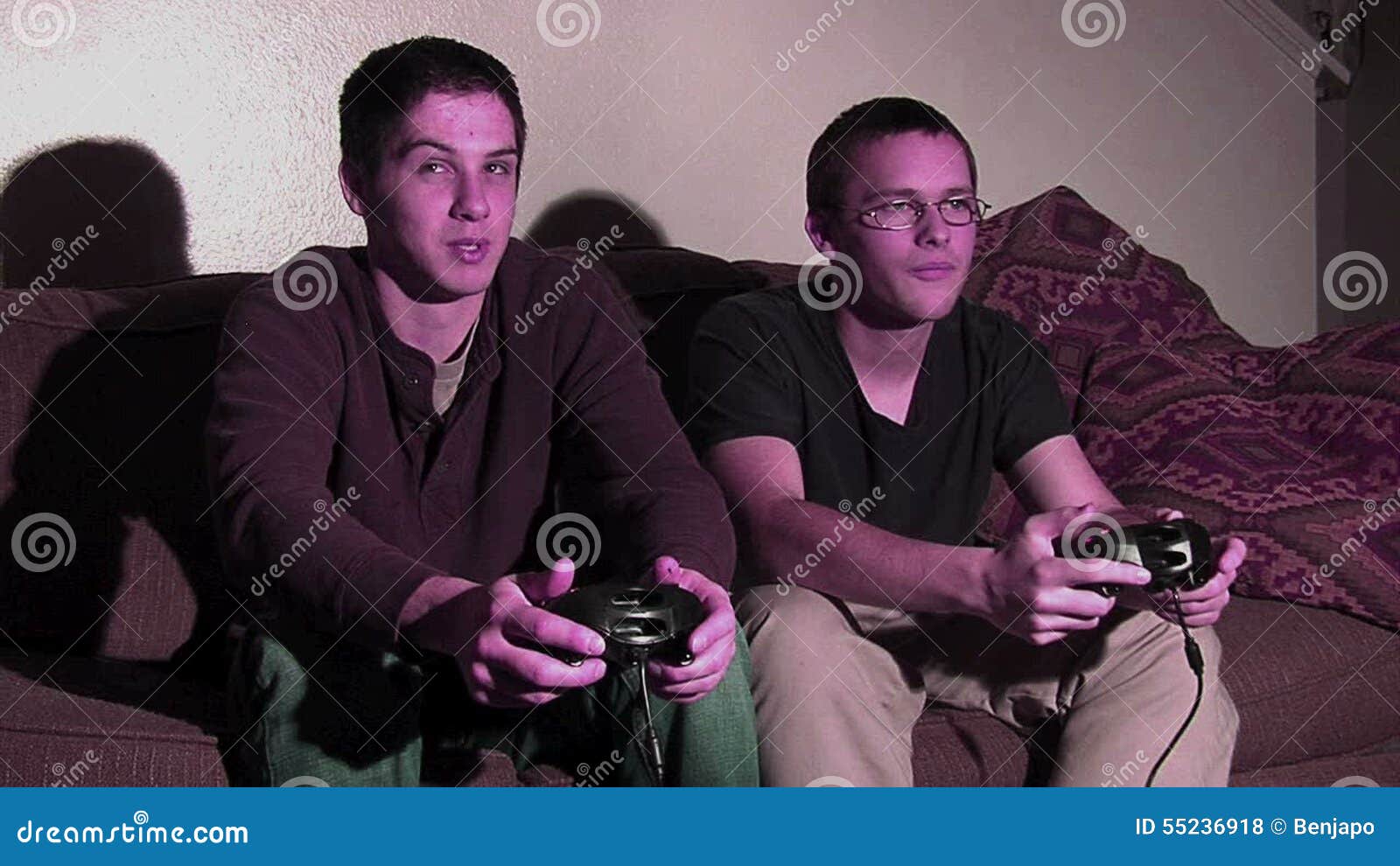 Two guys playing games. stock footage. Video of recreational - 55236918