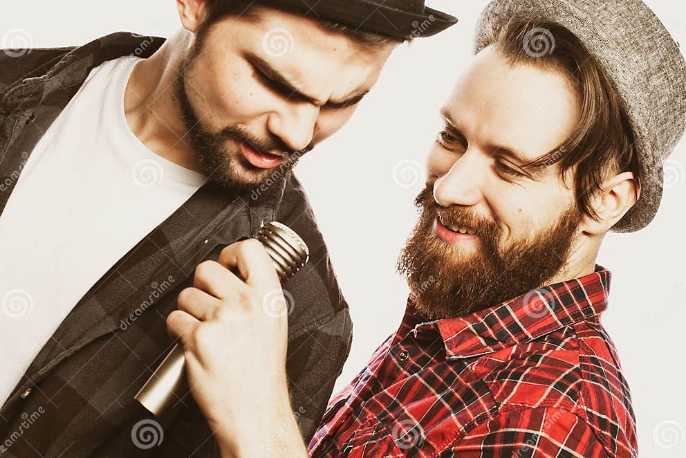 Two Guys Singing Over White Background Stock Image - Image of dancing ...