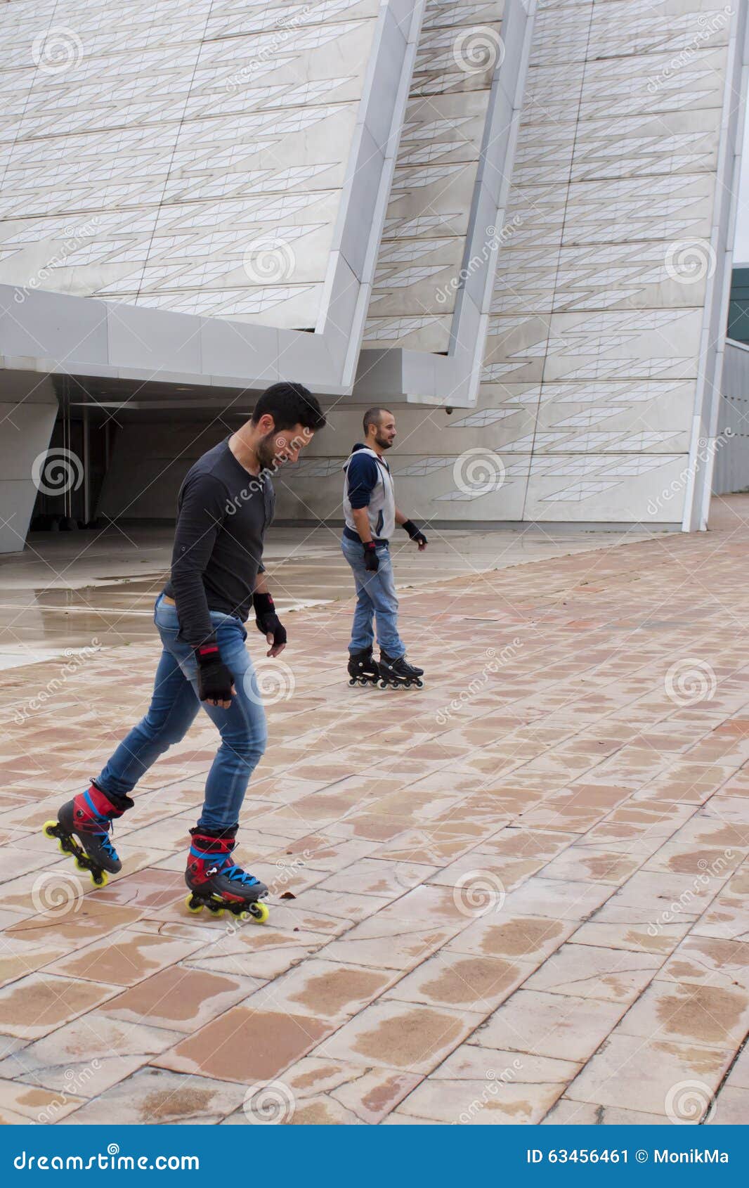 Two Guys Skating in-line in the Street Stock Image - Image of spain ...