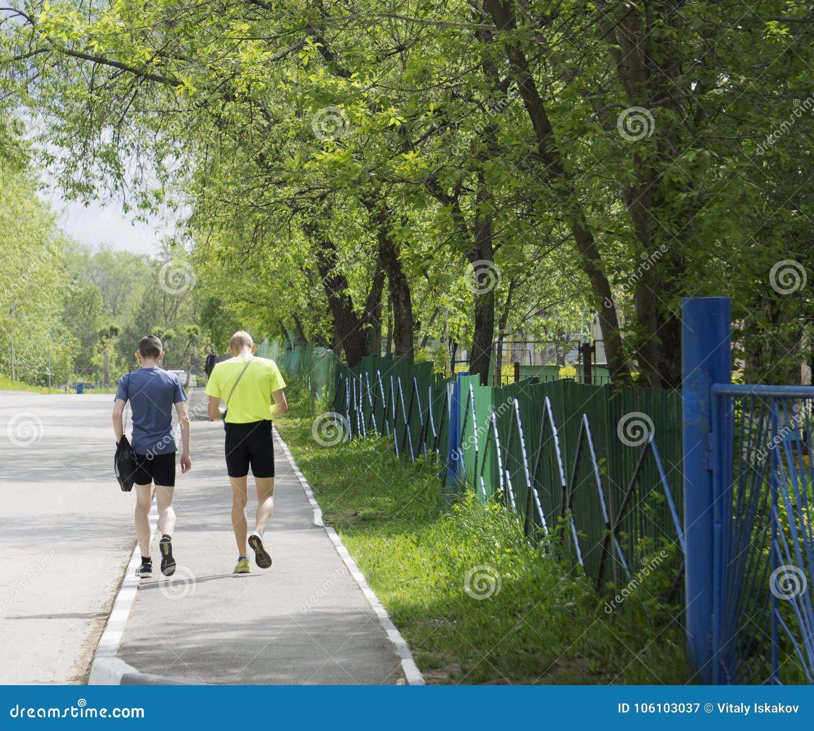 Two Guys are Walking Home after a Workout Stock Image - Image of guys ...