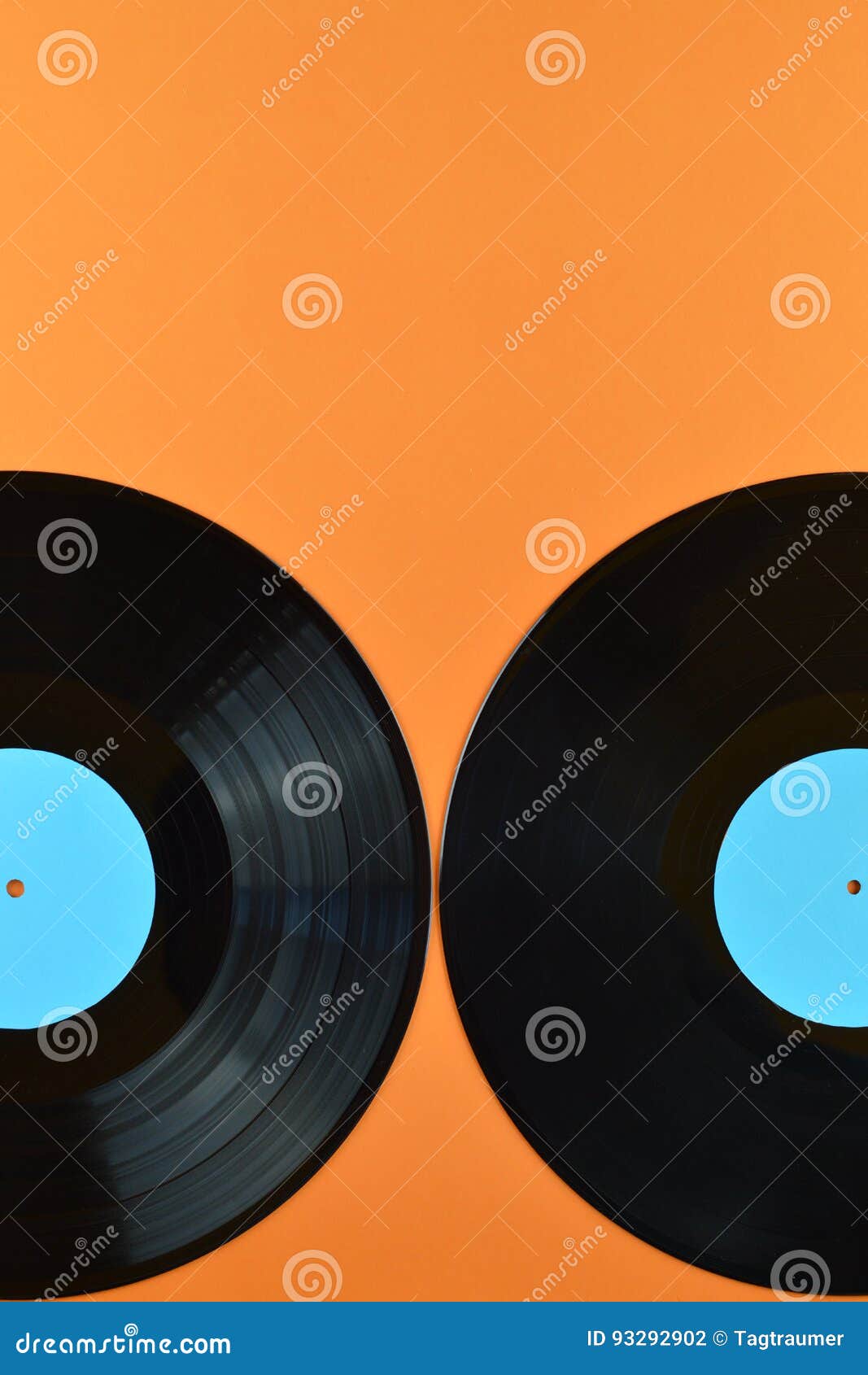 Two Half Black Vinyl Record on Orange Background Stock Photo - Image of ...