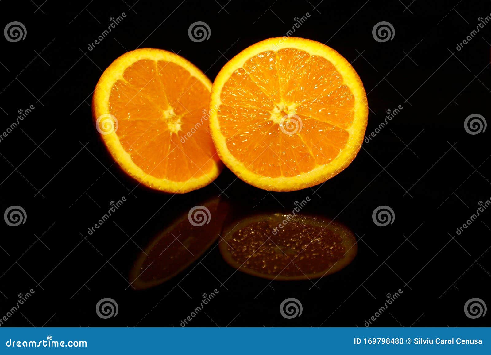 Two Half Orange Isolated on Black with Reflections Stock Photo - Image ...
