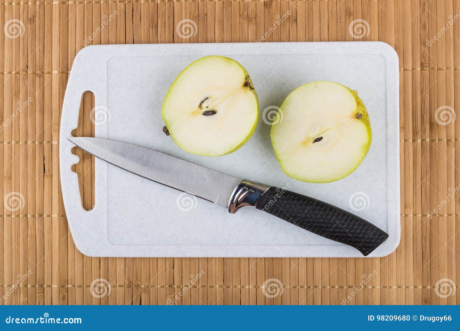 Two Half of Pear and Knife on Cutting Board Stock Photo - Image of ...