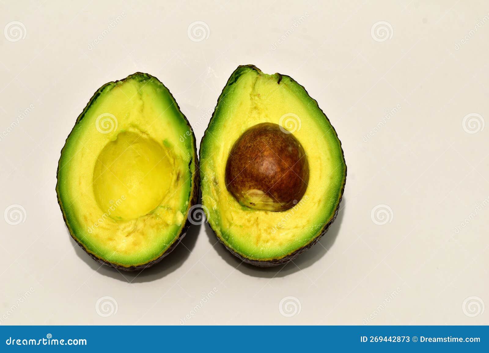 Two Halves of an Avocado, One with a Grain. Stock Image - Image of ...