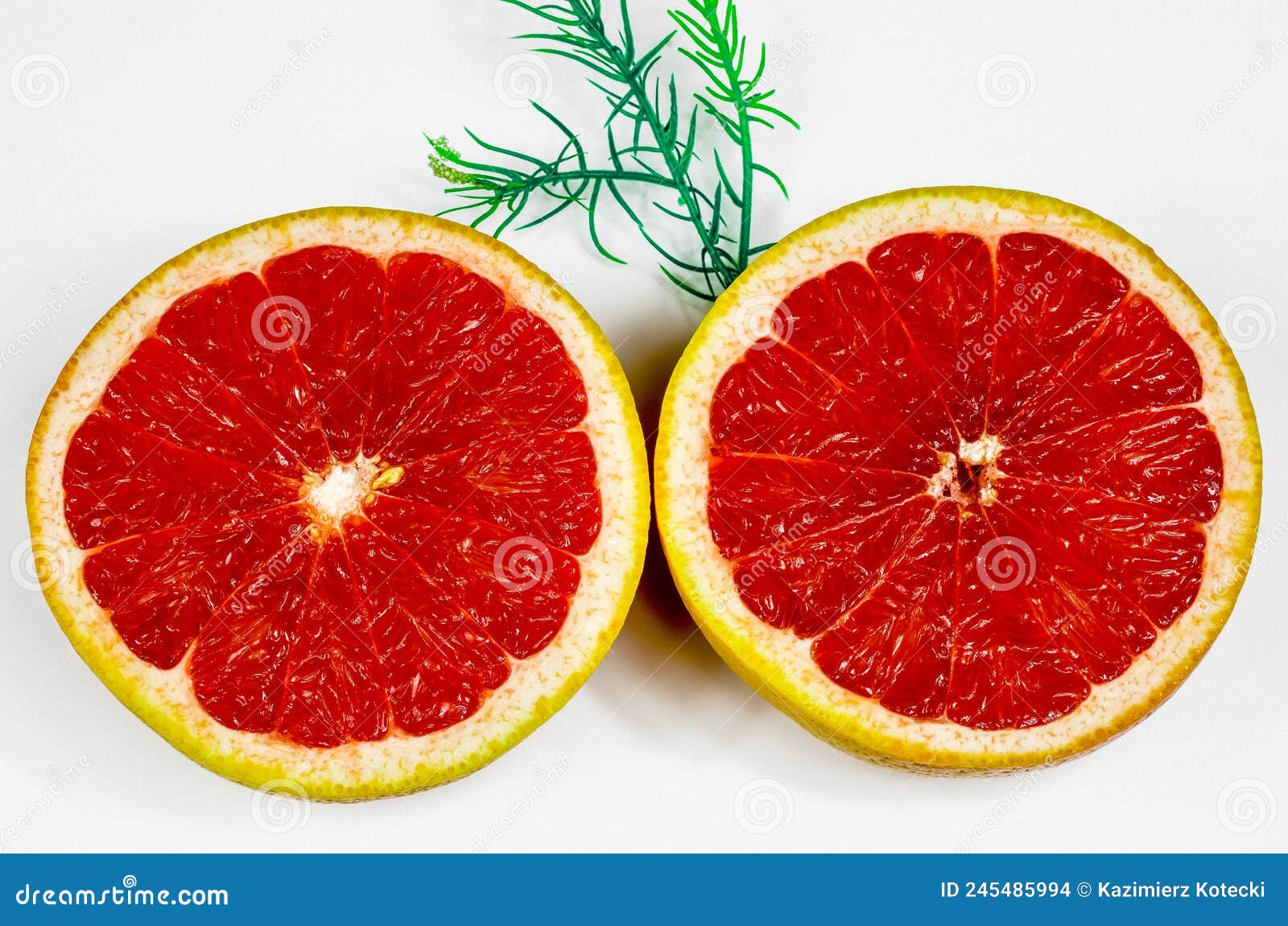 Two Halves of Grapefruit Shown Inside of a Fruit Isolated on White ...