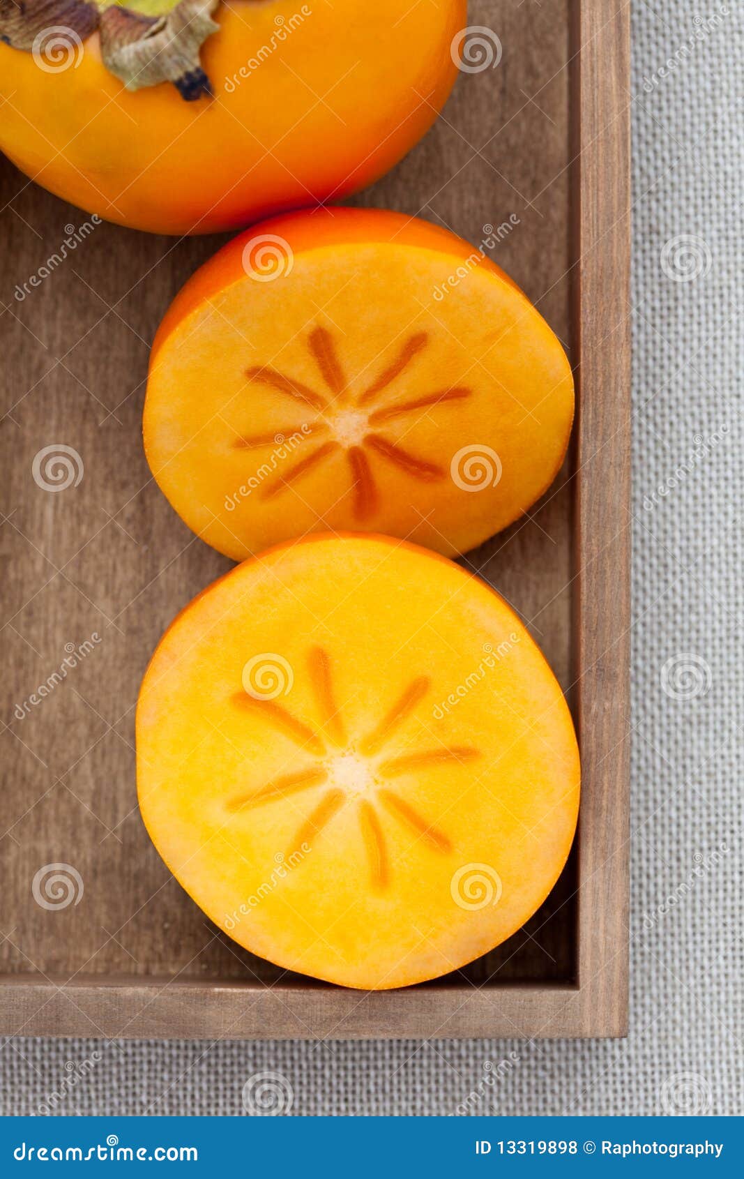 Two Halves of Persimmon in a Wooden Box Stock Photo - Image of ...