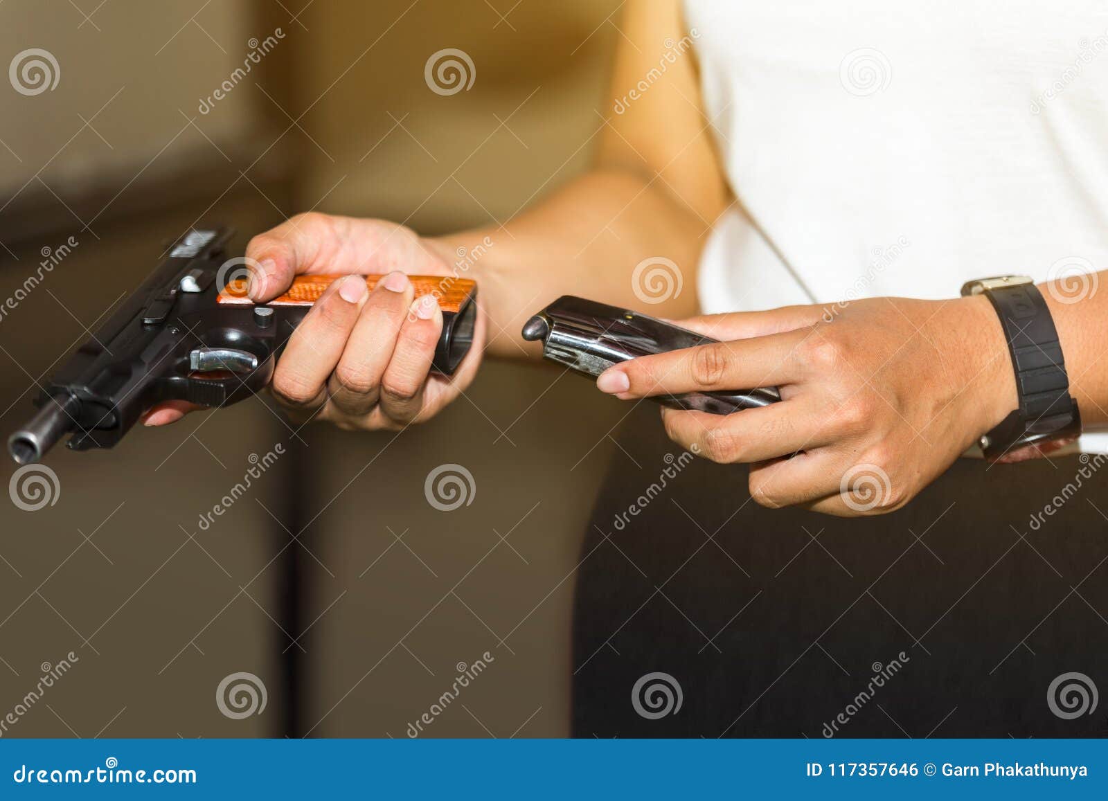 Two Hand Reloading Law Enforcement Pistol in Academy Shooting Ra Stock ...