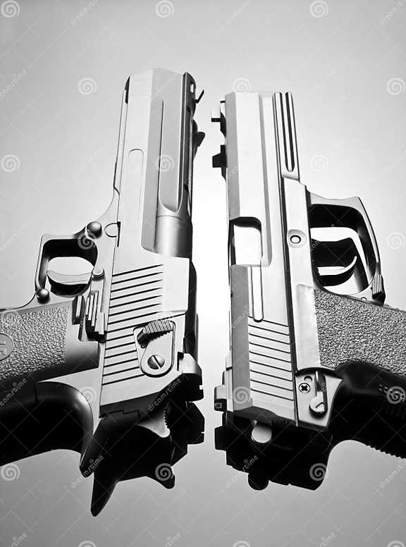 Two handguns stock photo. Image of black, desert, artificial - 14633422