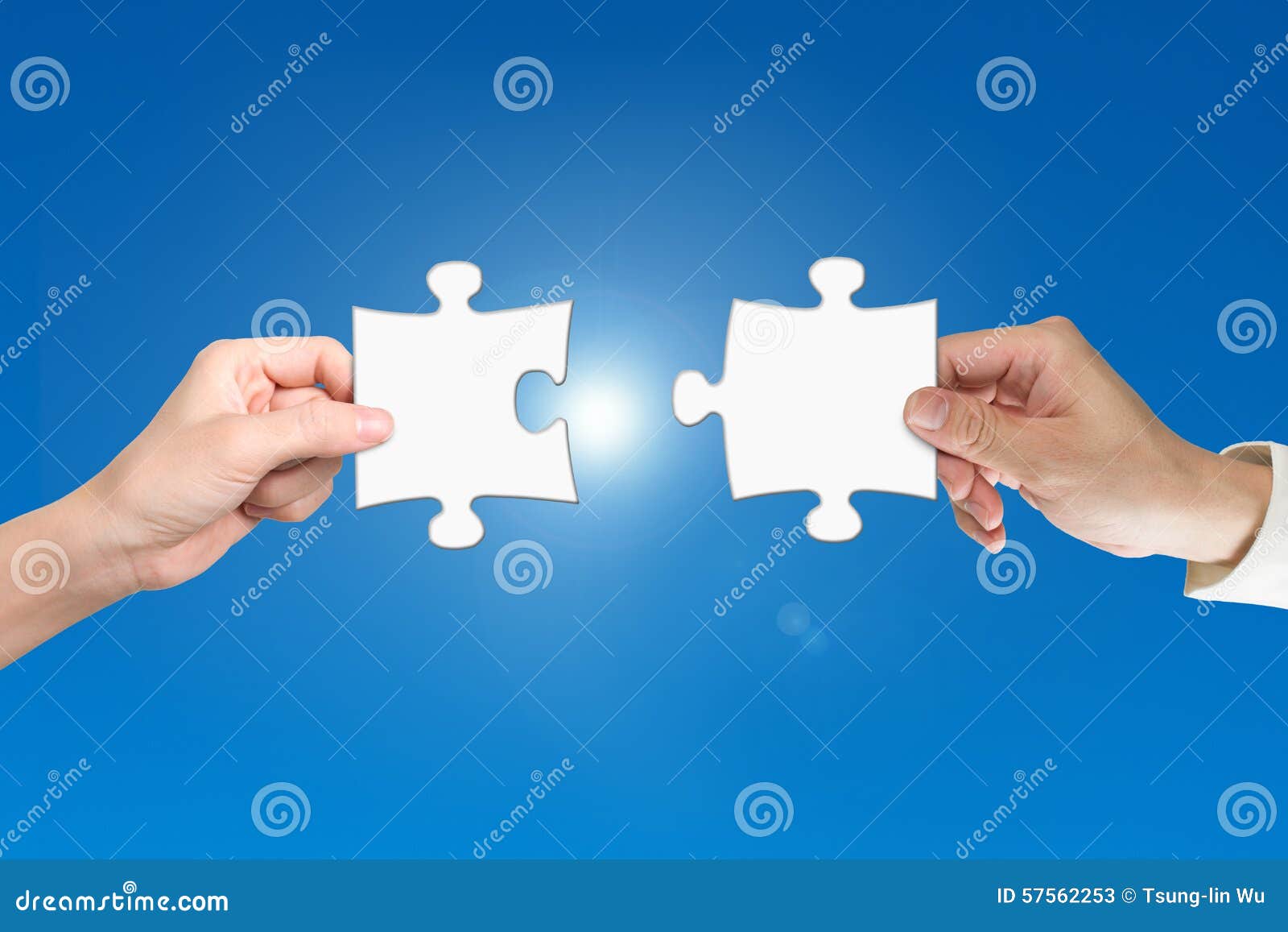 Two Hands Assembling Jigsaw Puzzle Pieces Stock Image - Image of ...