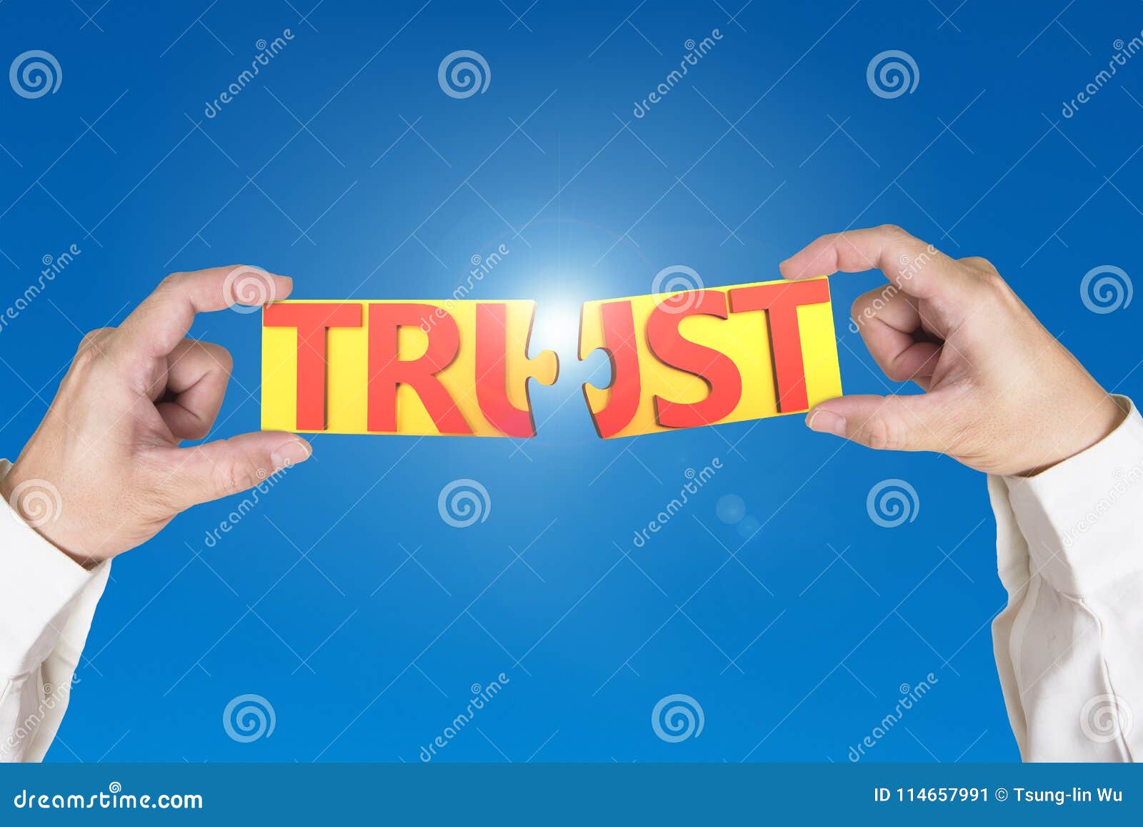 Two Hands Assembling Puzzle Pieces with Word TRUST Stock Image - Image ...