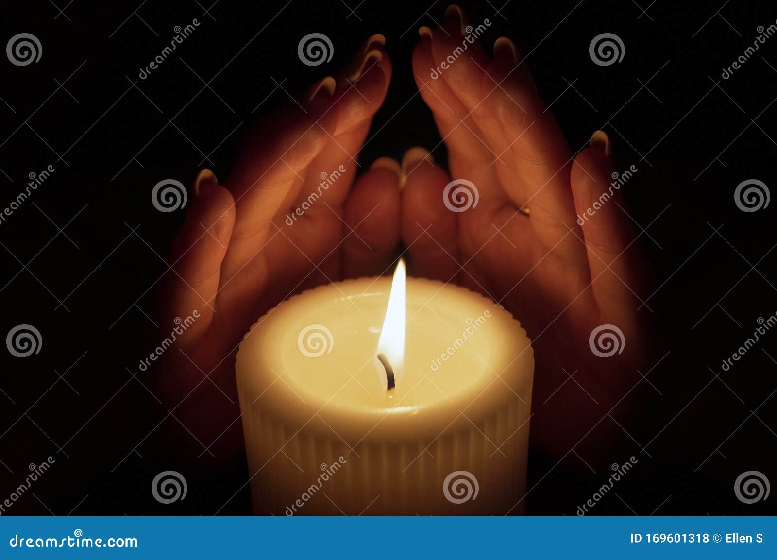 Two Hands are Raised Over a Burning Candle Stock Photo - Image of ...