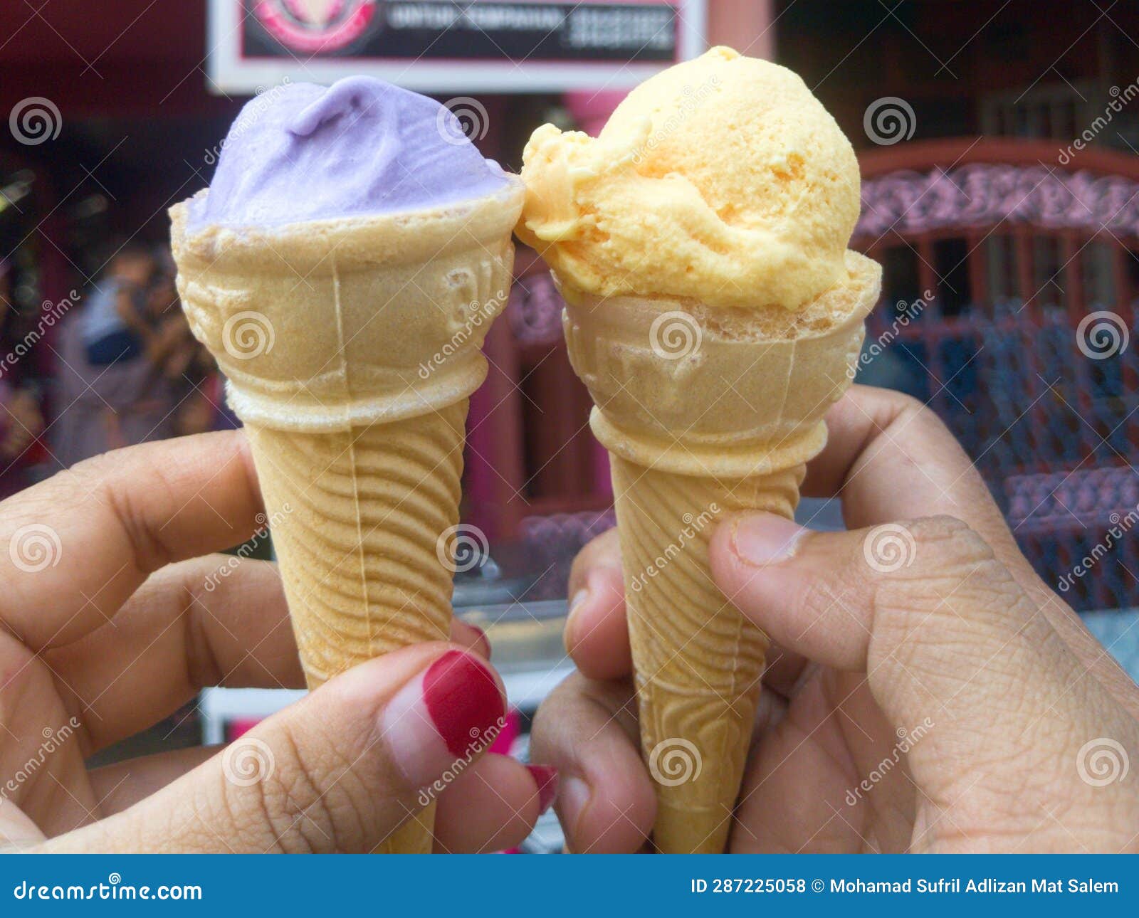 Two Hands Each Holding an Ice Cream Cone. Stock Photo - Image of cone ...