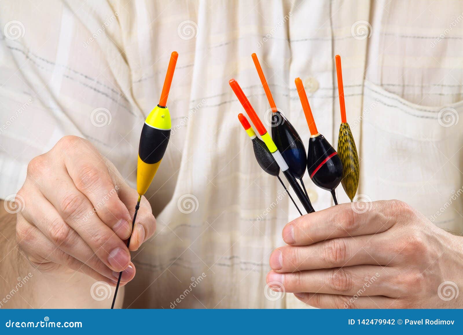 Two Hands of the Fisherman Who Chooses the Right Float Stock Photo ...
