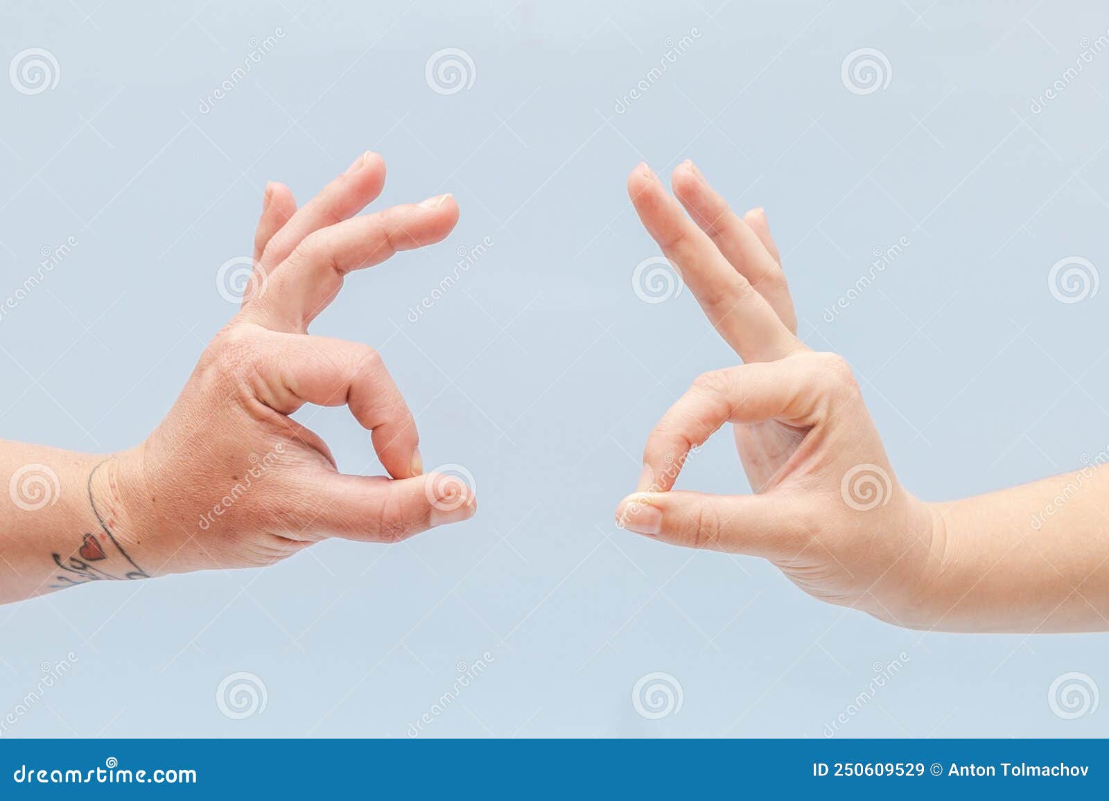 Two Hands Gesturing on a Blue Background Stock Image - Image of ...