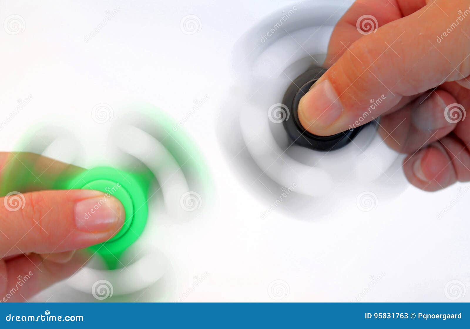 Two Hands Holding Fidget Spinners Stock Image - Image of fidget ...
