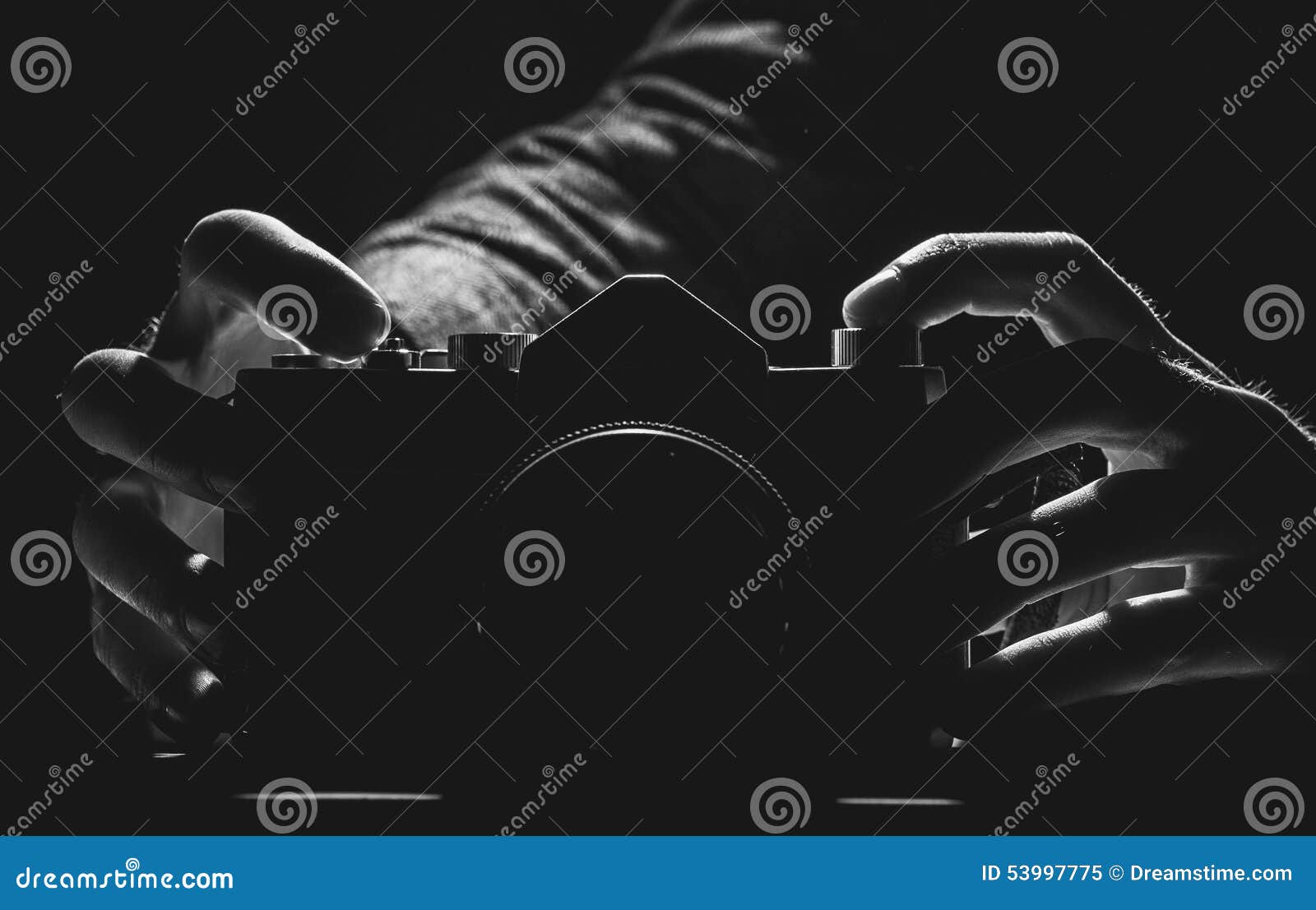 Two Hands Holding a Hidden Camera in Black and White Stock Image ...