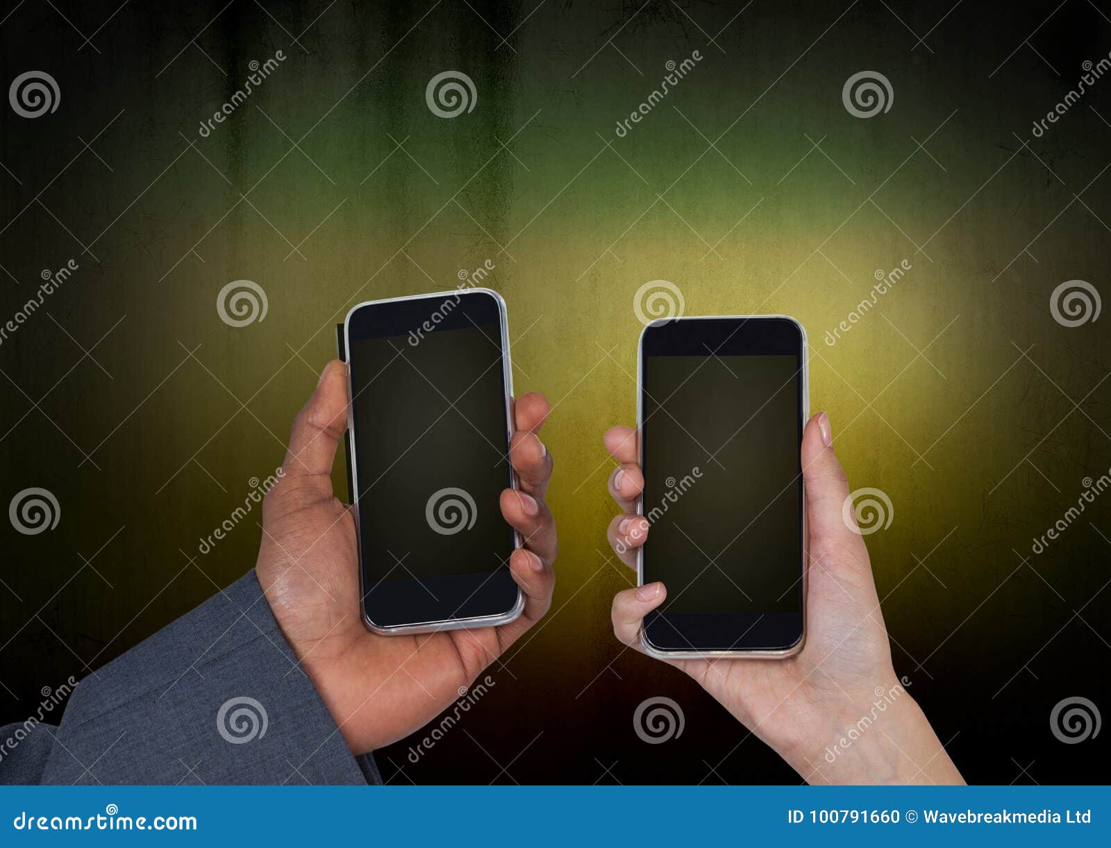 Two hands holding phones stock photo. Image of background - 100791660